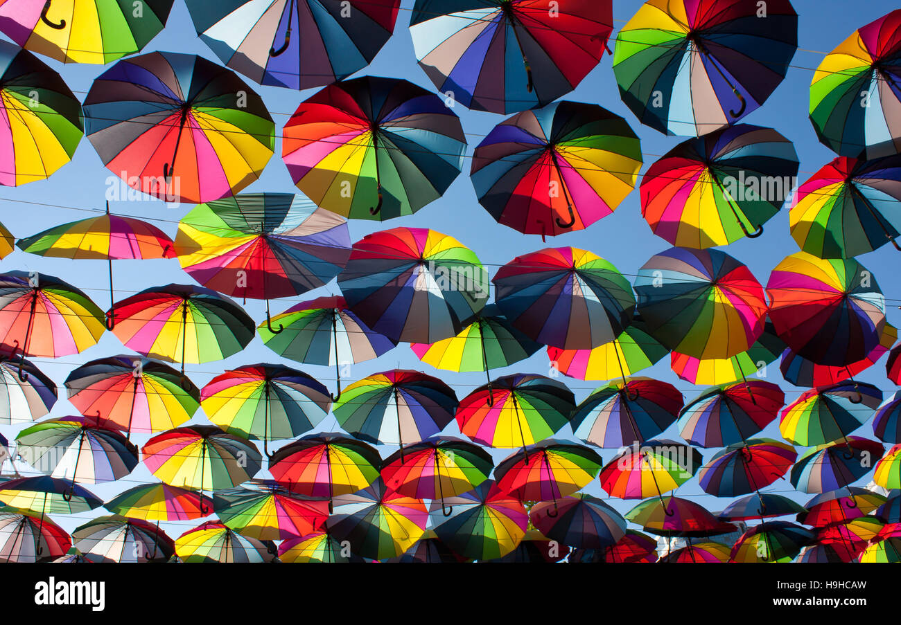Multi-colored umbrellas in the sky.Umbrellas rainbow colors Stock Photo ...