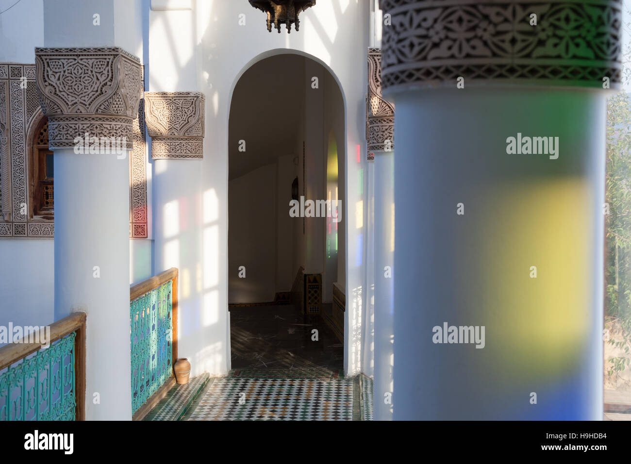 Interior of the Riad Arabesque illuminated by colored window glass in ...
