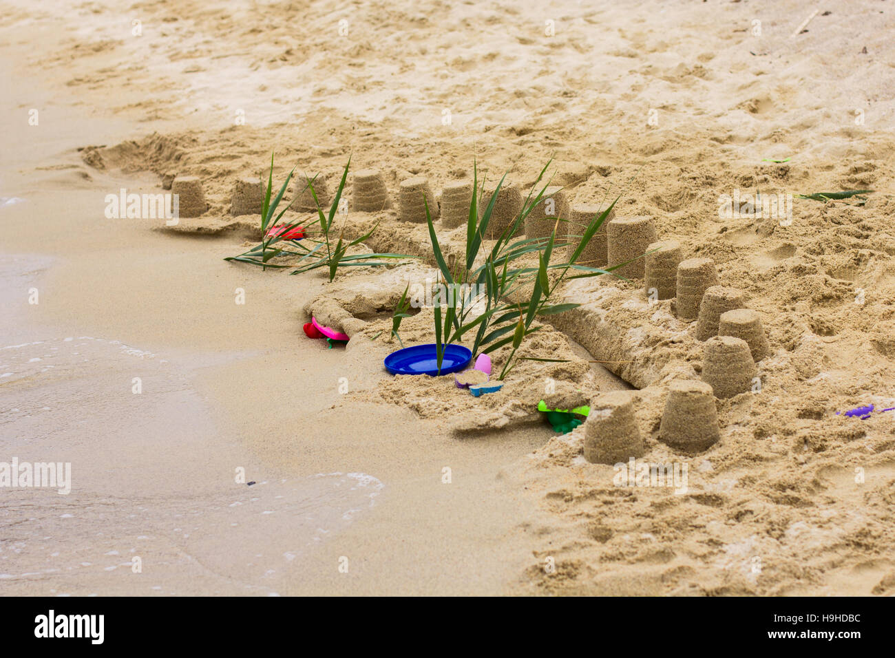 Sand castle on the beach, summer vacation Stock Photo - Alamy