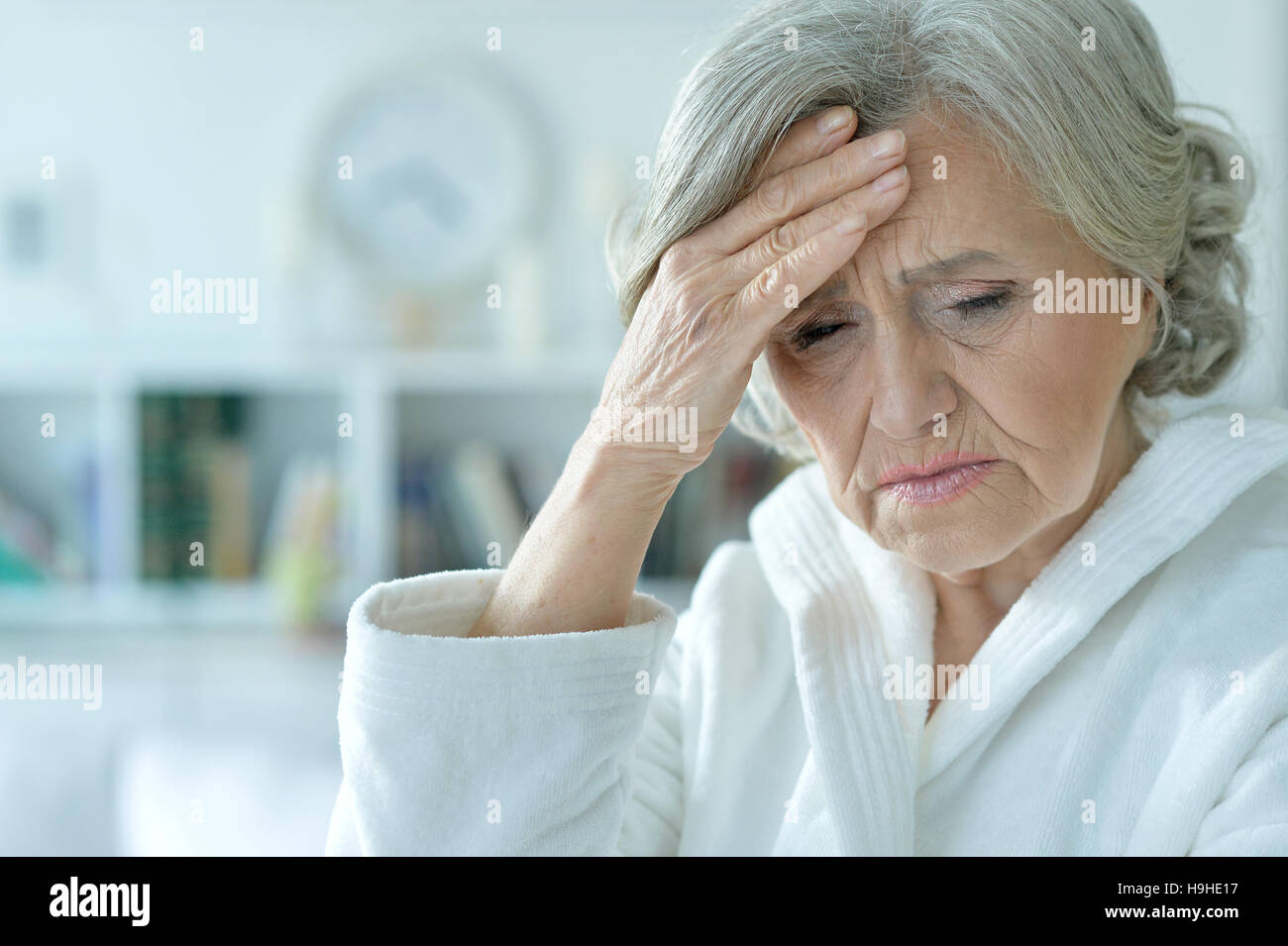 Sad Sad senior woman Stock Photo - Alamy