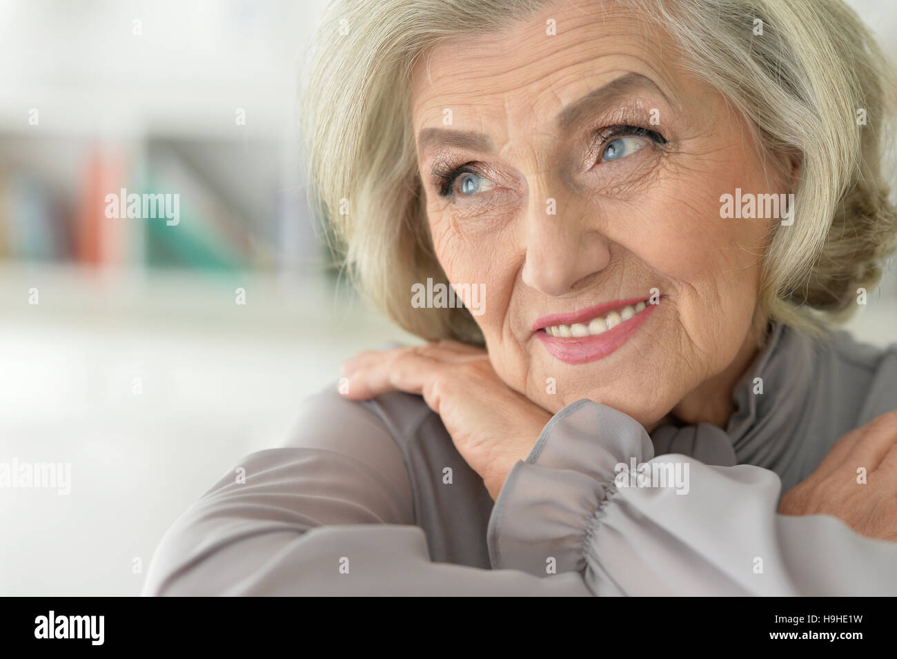 Smiling senior woman Stock Photo - Alamy