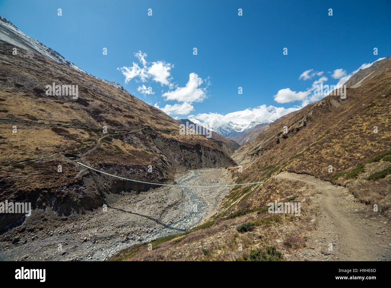 Beautiful mountain landscape with a suspension bridge on Annapurna ...