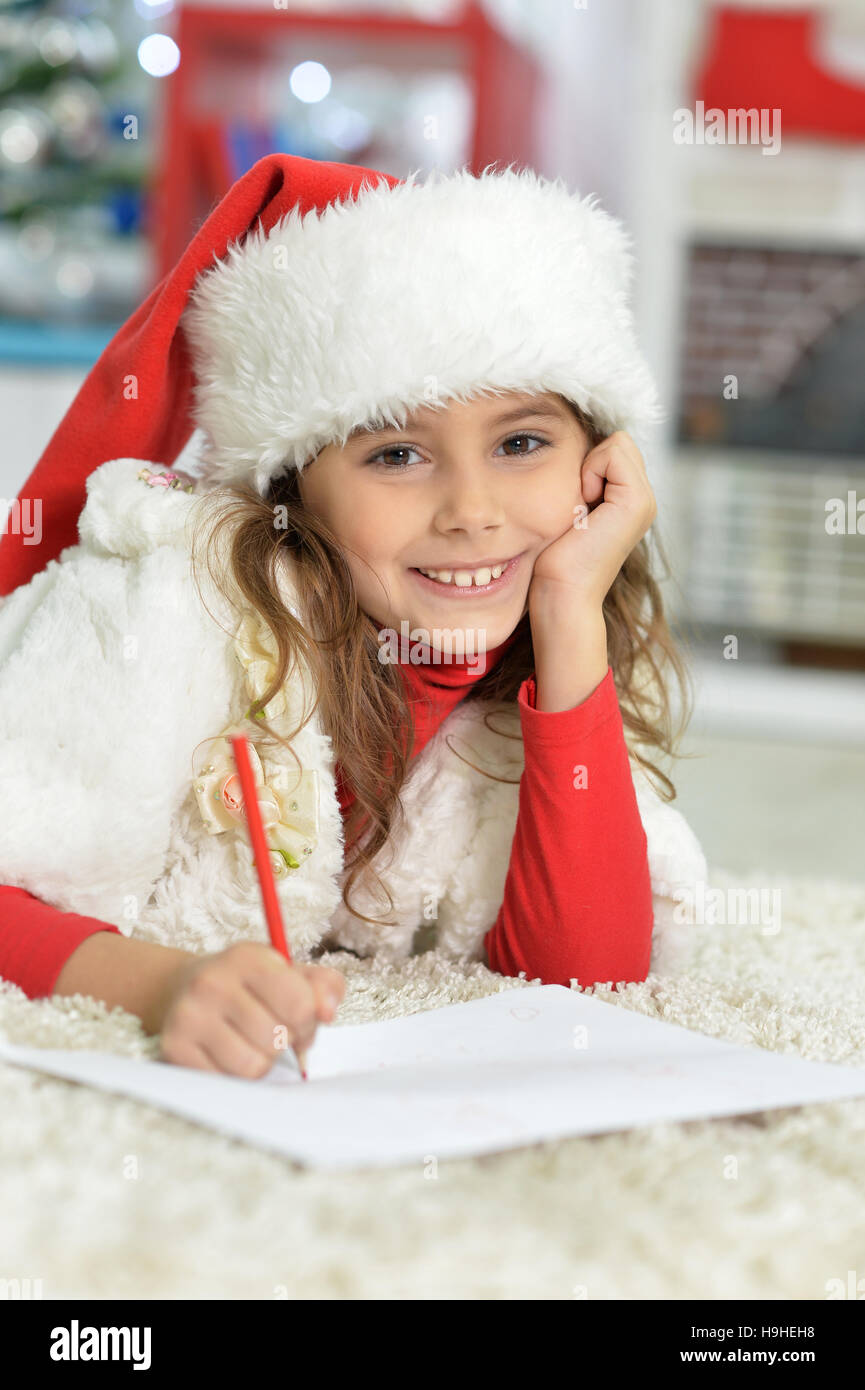 Little girl writing letter Stock Photo - Alamy