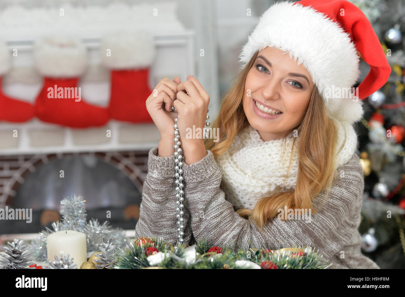 Girl in Santa hat Stock Photo - Alamy