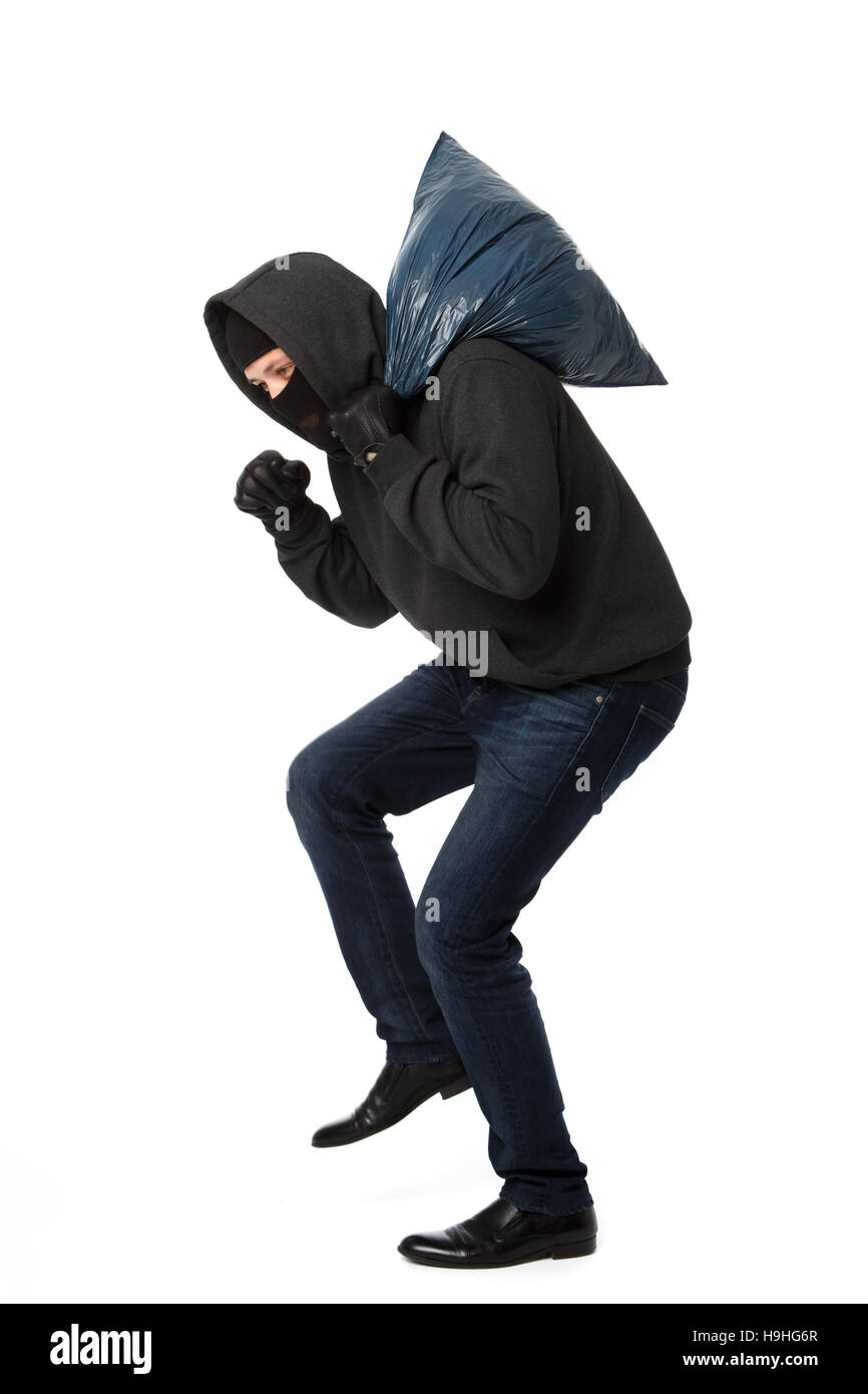 Robber steals with large bag Stock Photo - Alamy