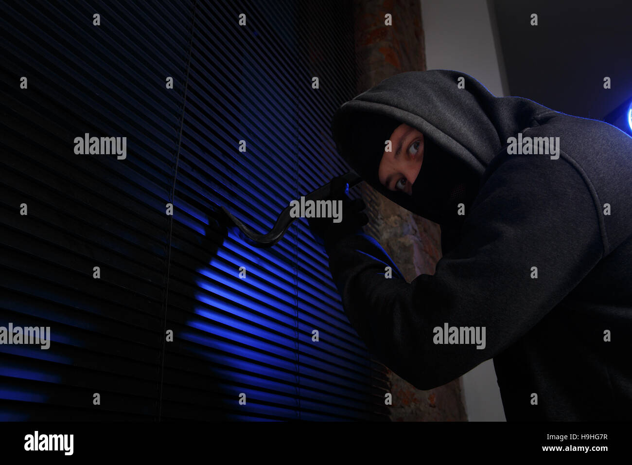 Robber with picklock at night Stock Photo - Alamy