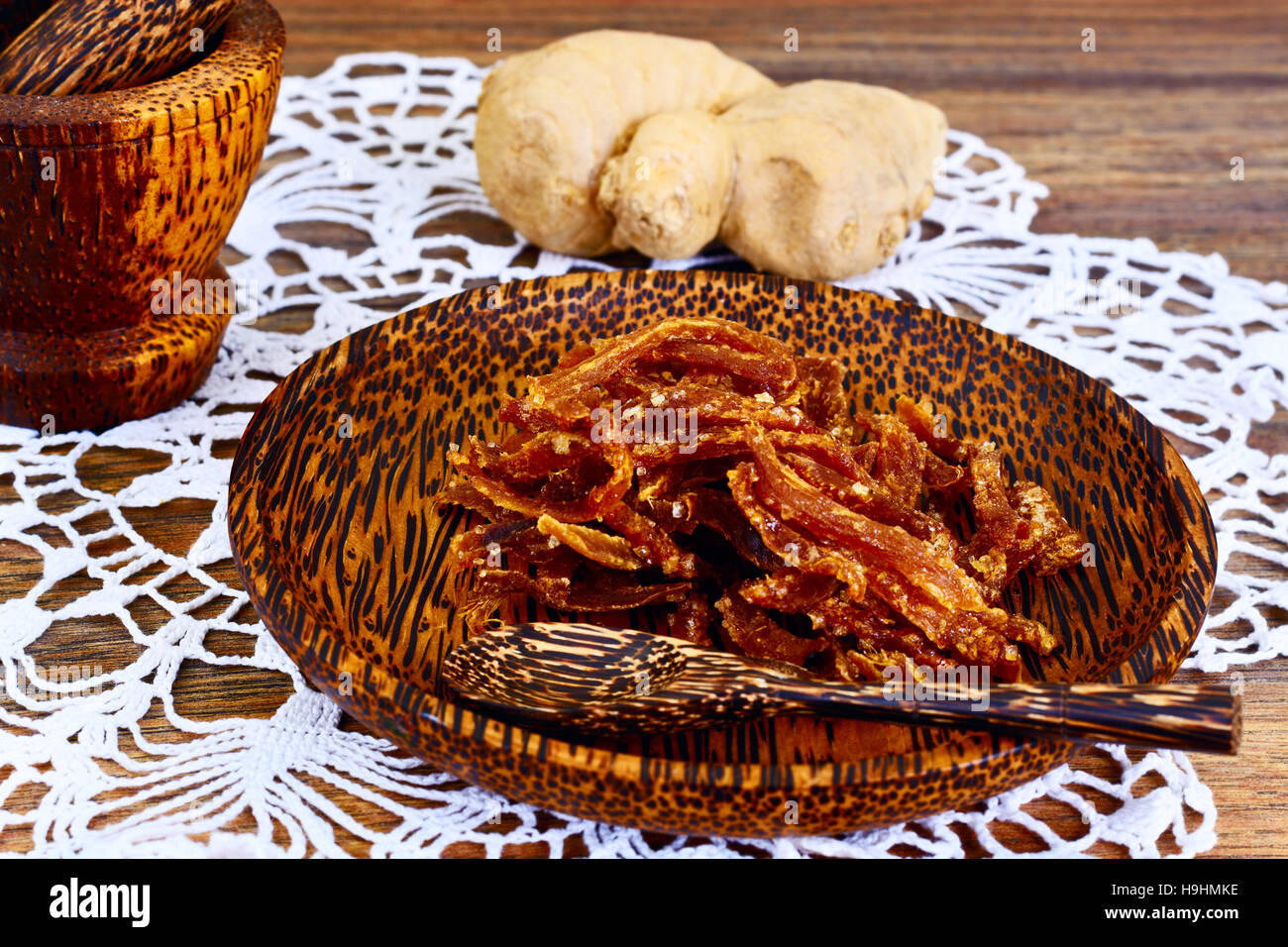 Fresh ginger, sun-dried, candied on Wood Background. Studio Photo Stock ...