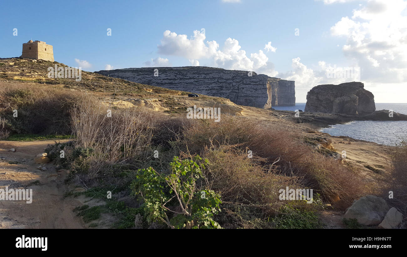 Qawra Tower and Fungus Rock at Dwejra Bay, Gozo Stock Photo - Alamy