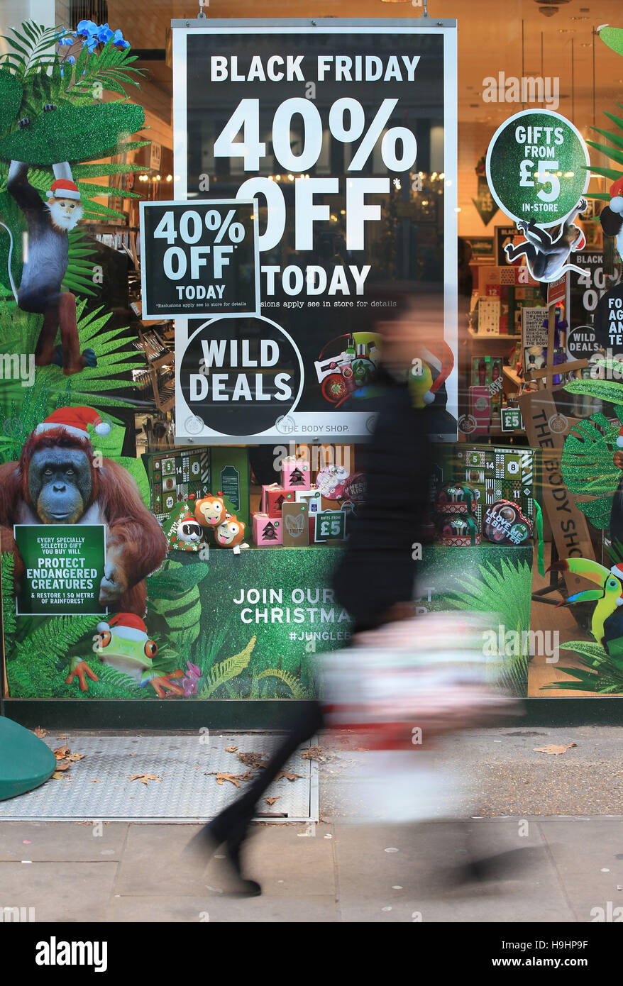 Discount signs in a shop window on London's Kensington High Street as ...