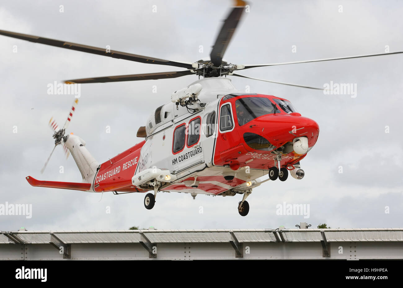 HM Coastguard Search and Rescue Helicopter 104 lands on a helipad at St ...