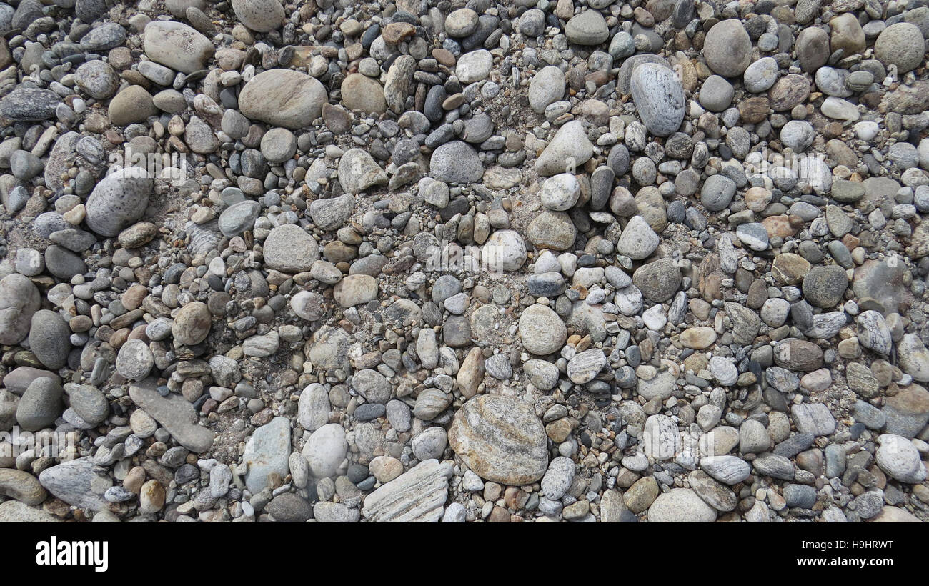 RIVER WASHED PEBBLES in Bhutan. Photo Tony Gale Stock Photo - Alamy