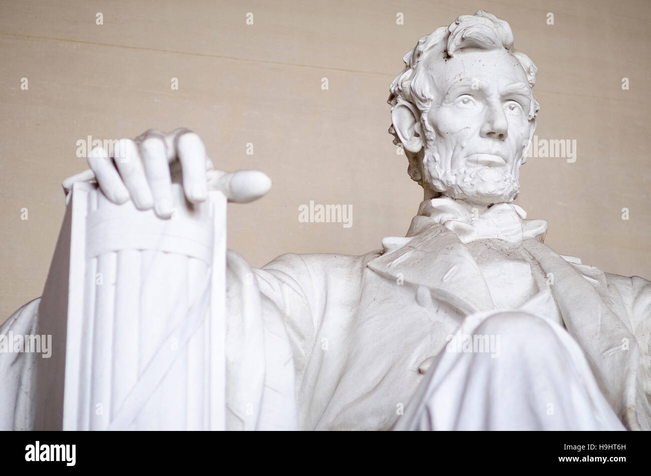 Statue of American president Abraham Lincoln seated in white marble at ...