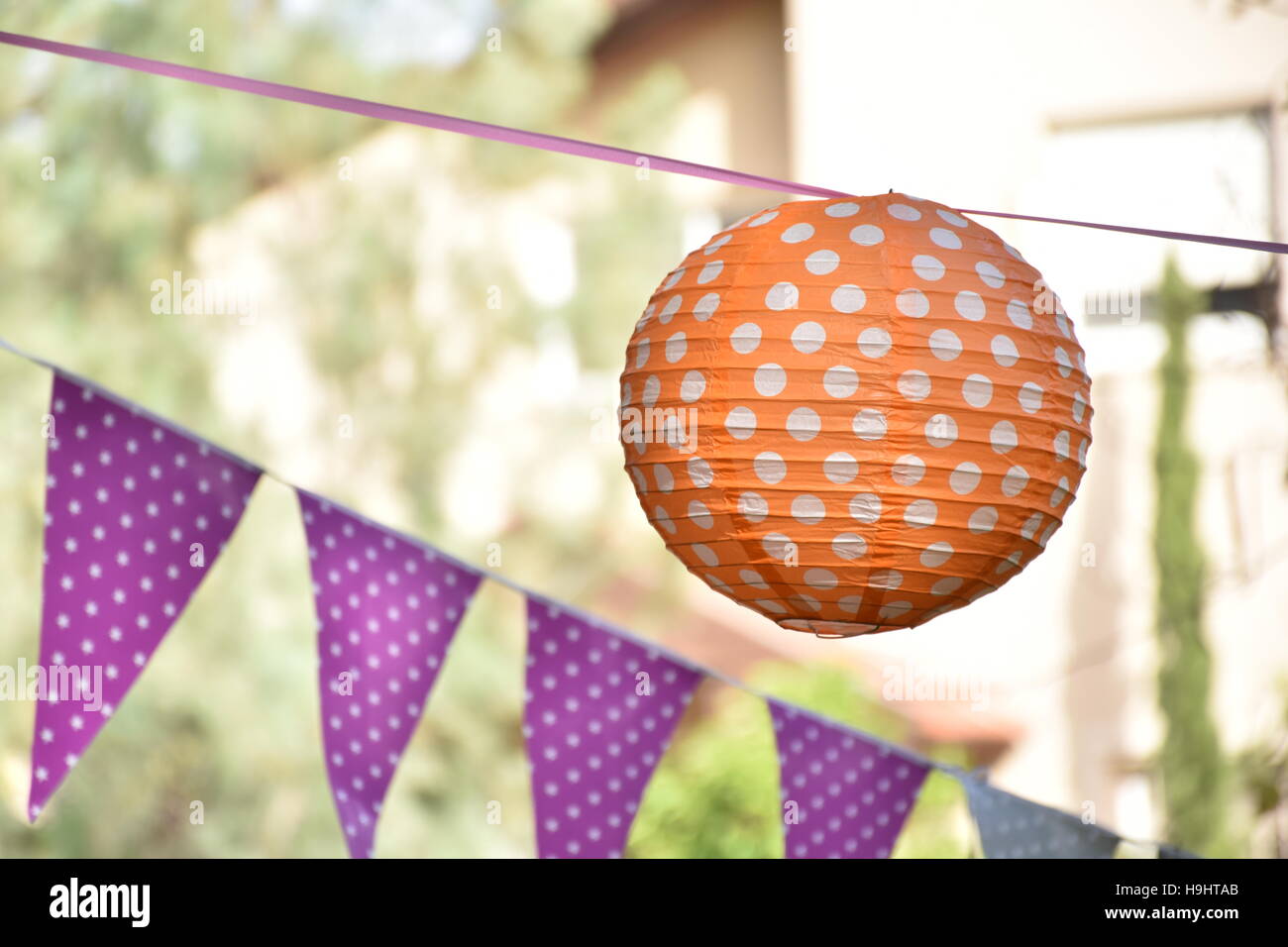 party decorations outdoors: orange ball and purple flags Stock Photo ...