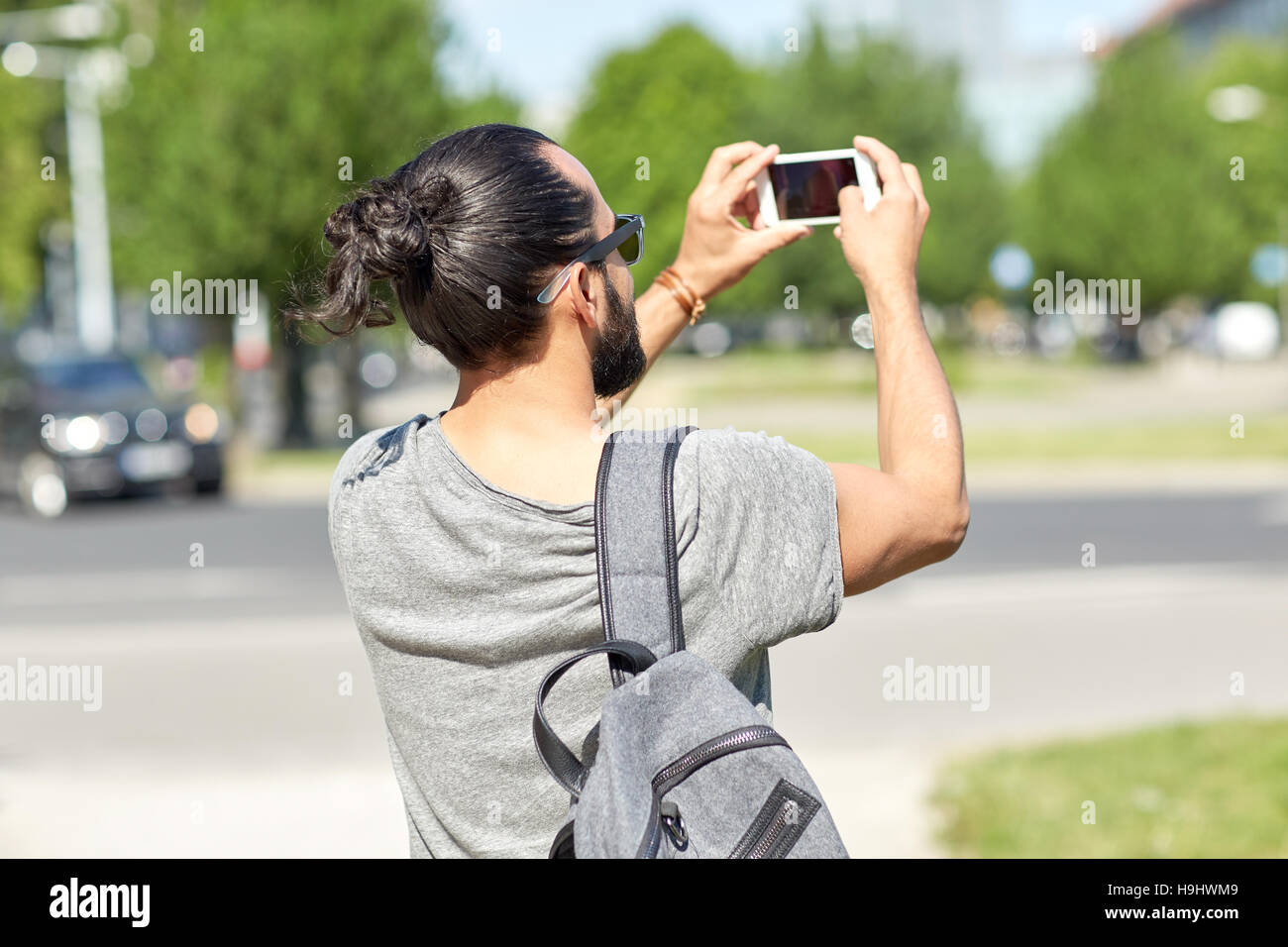 Back view of man taking picture of hi-res stock photography and images ...