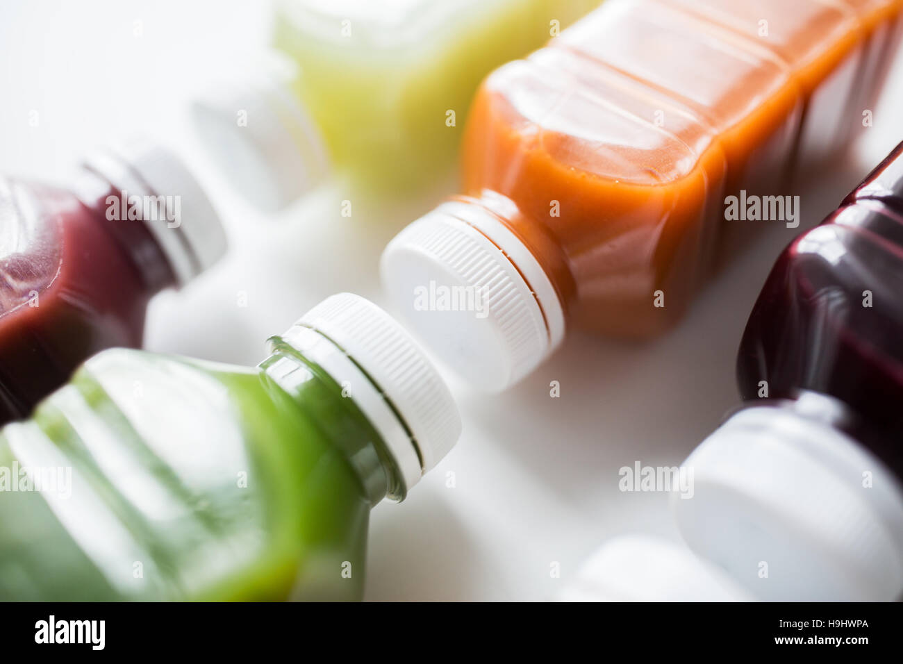 bottles with different fruit or vegetable juices Stock Photo - Alamy