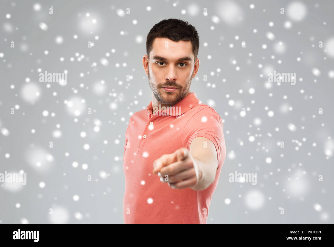 angry man pointing finger to you over snow Stock Photo - Alamy