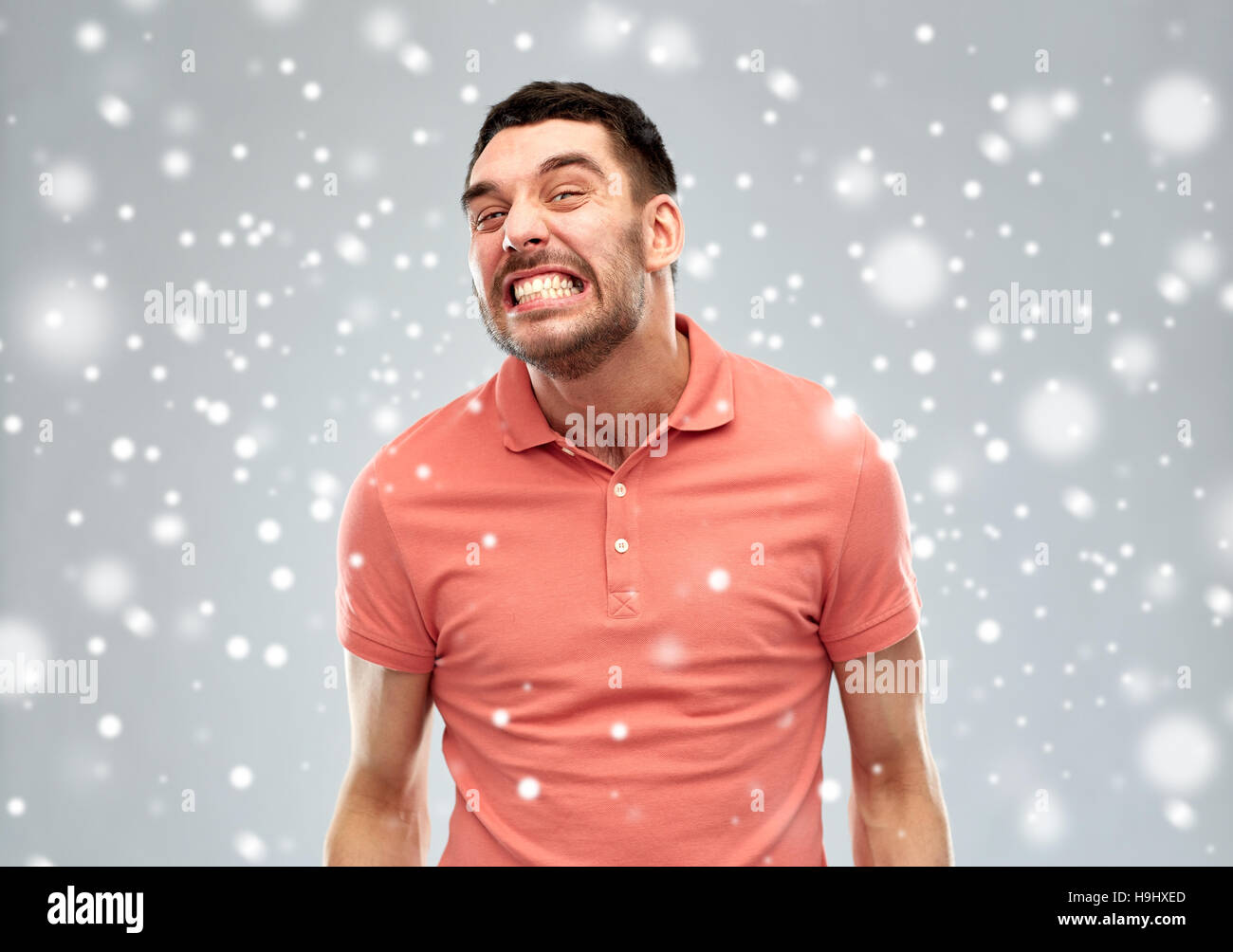 angry man over snow Stock Photo - Alamy