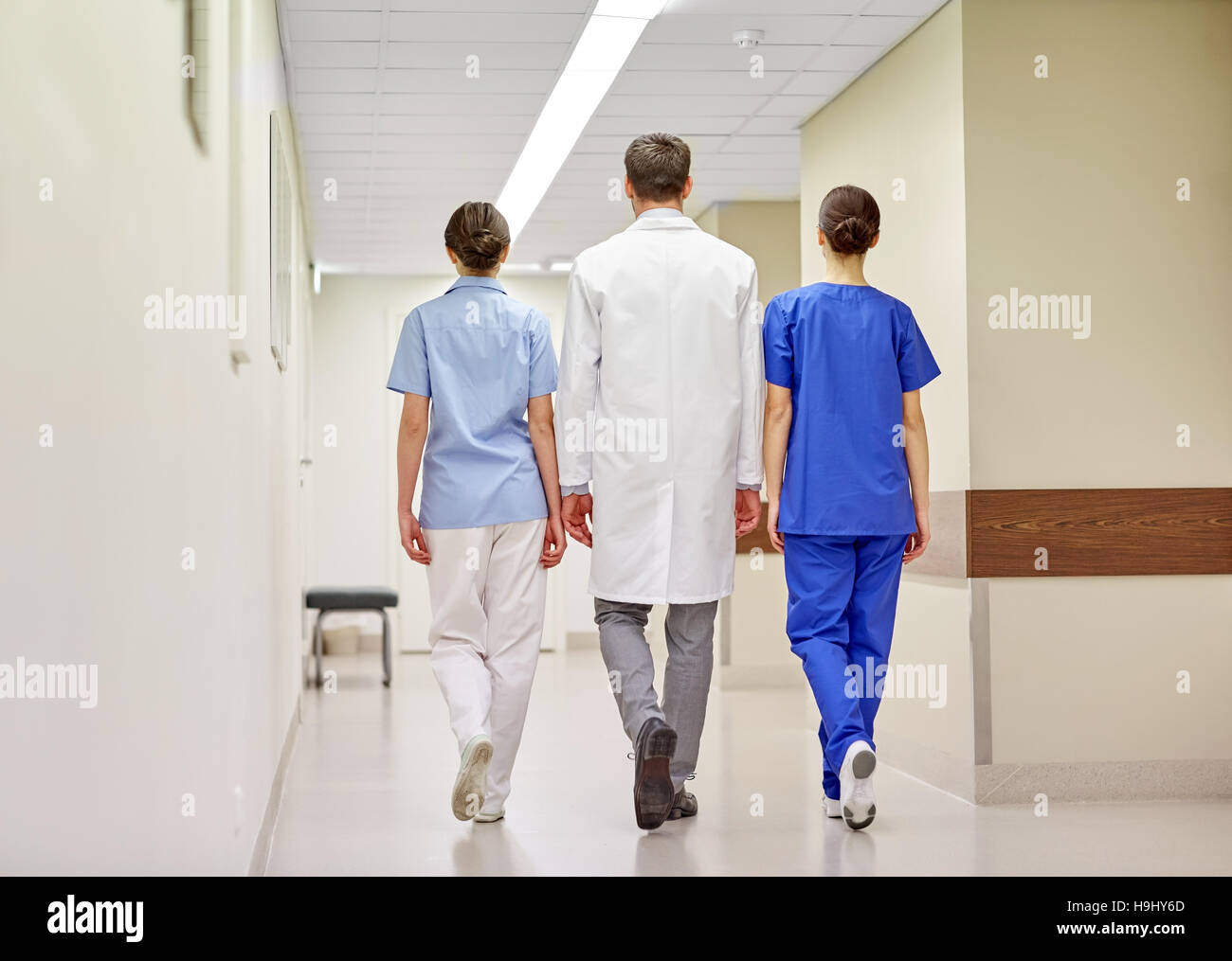 group of medics or doctors walking along hospital Stock Photo - Alamy