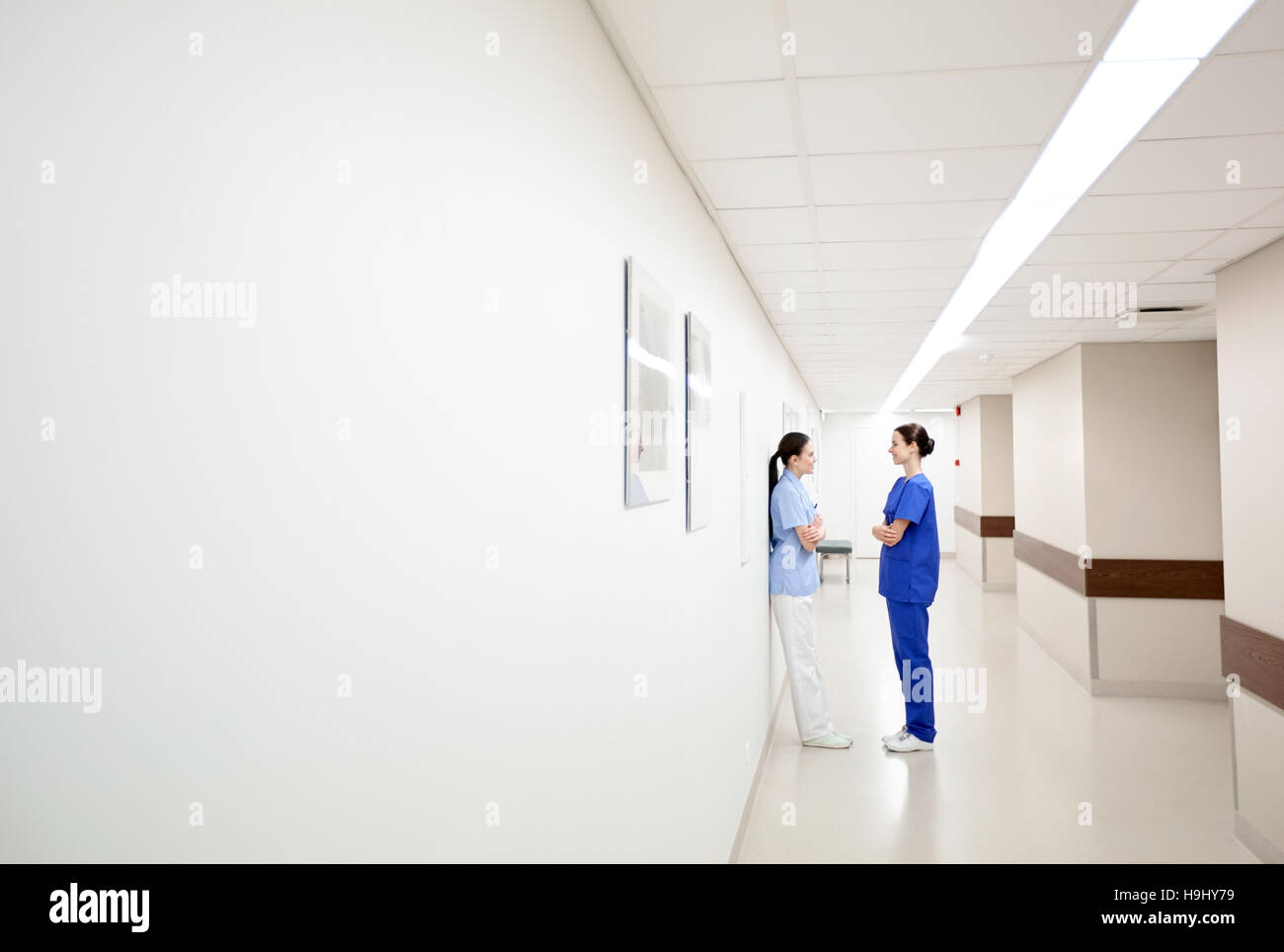female doctors or nurses talking at hospital Stock Photo - Alamy