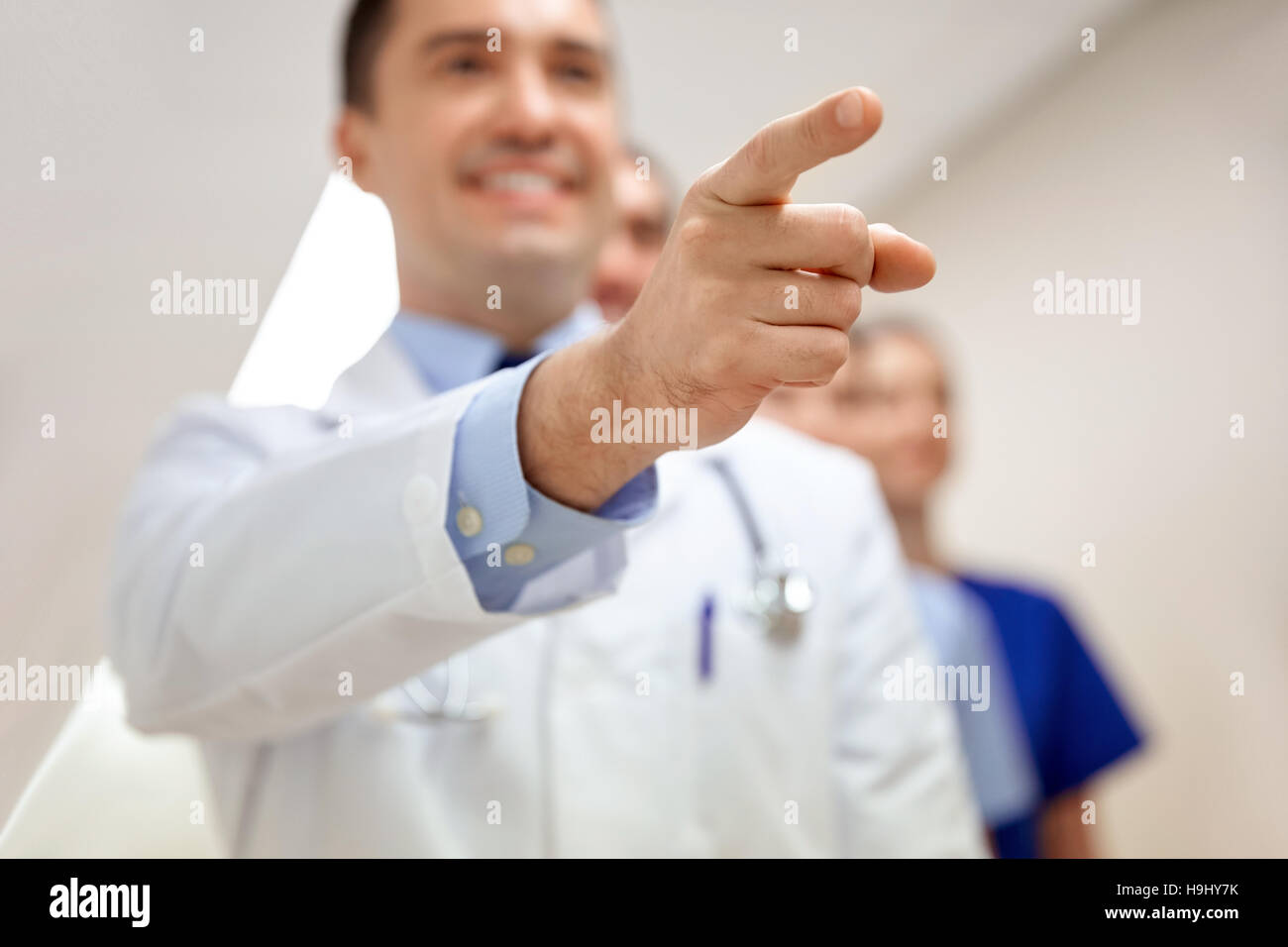 close up of doctor pointing finger at hospital Stock Photo - Alamy