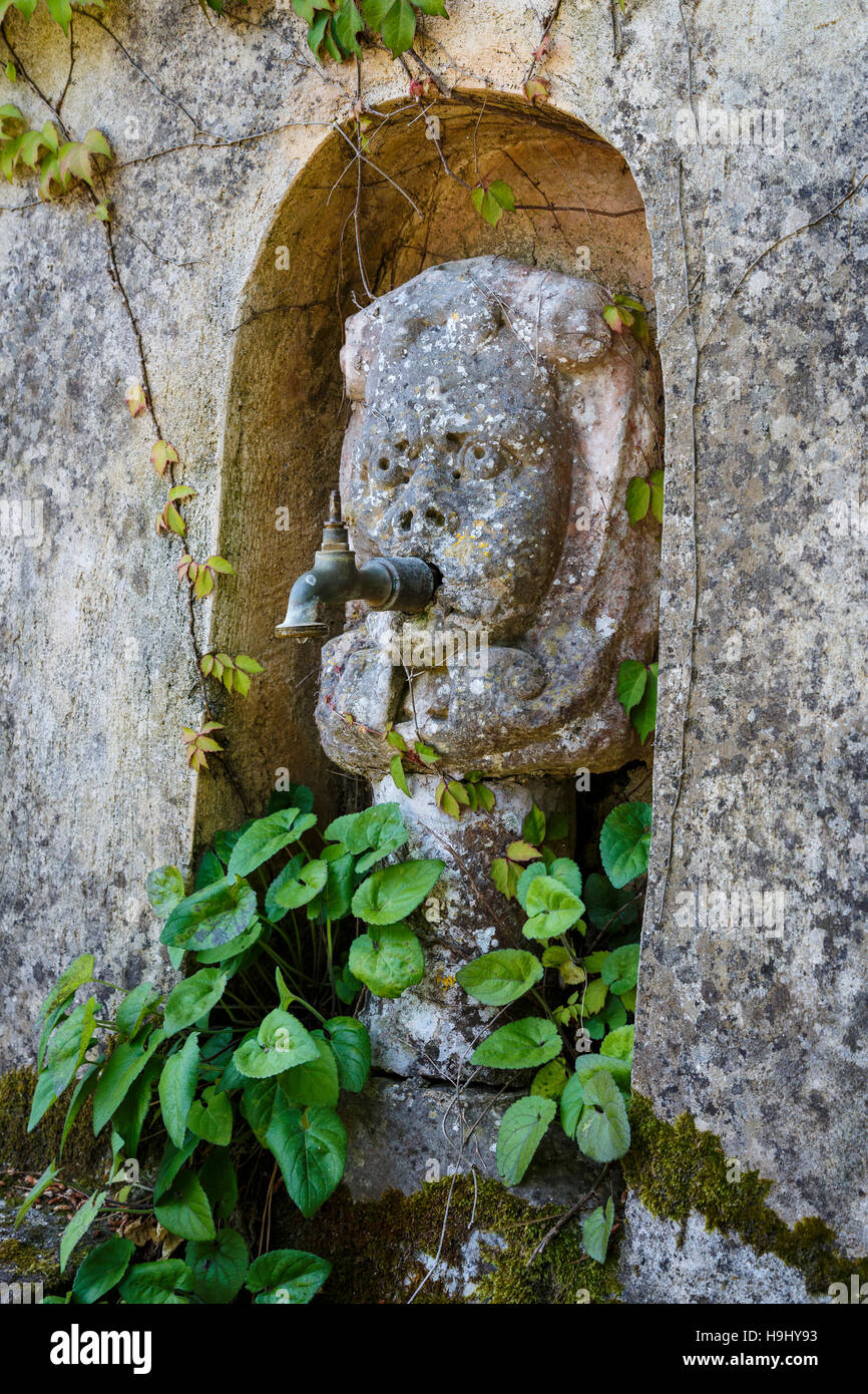 Water tap with sculpted head mount at the 11thC Villa Cimbrone in ...