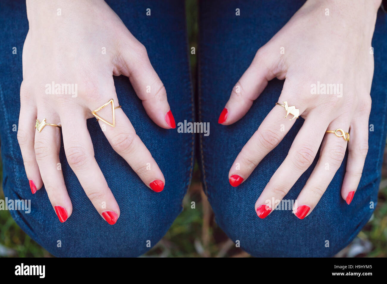 Female hands with collection of hipster golden rings Stock Photo - Alamy
