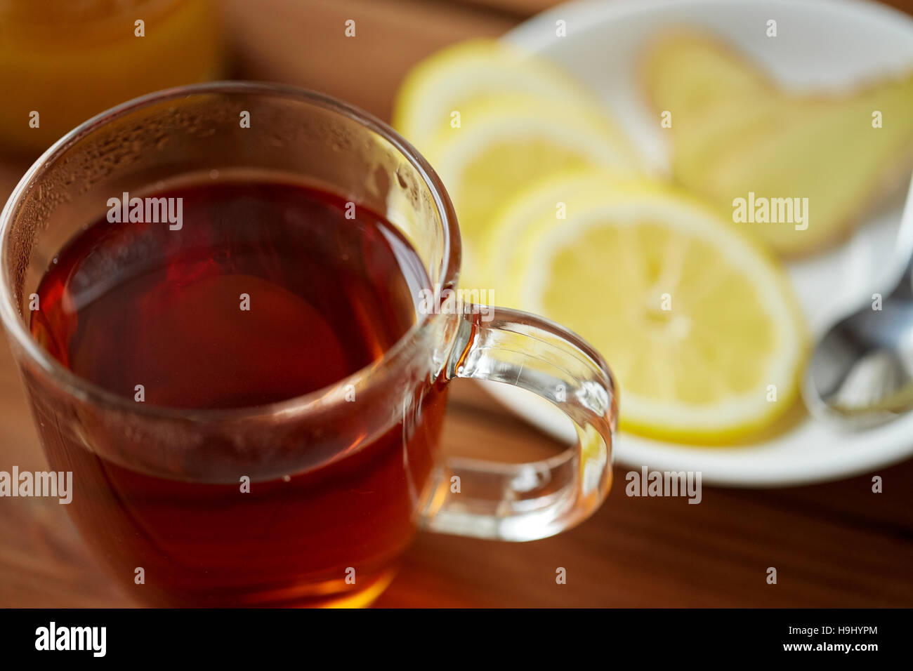 tea cup with lemon and ginger on plate Stock Photo - Alamy
