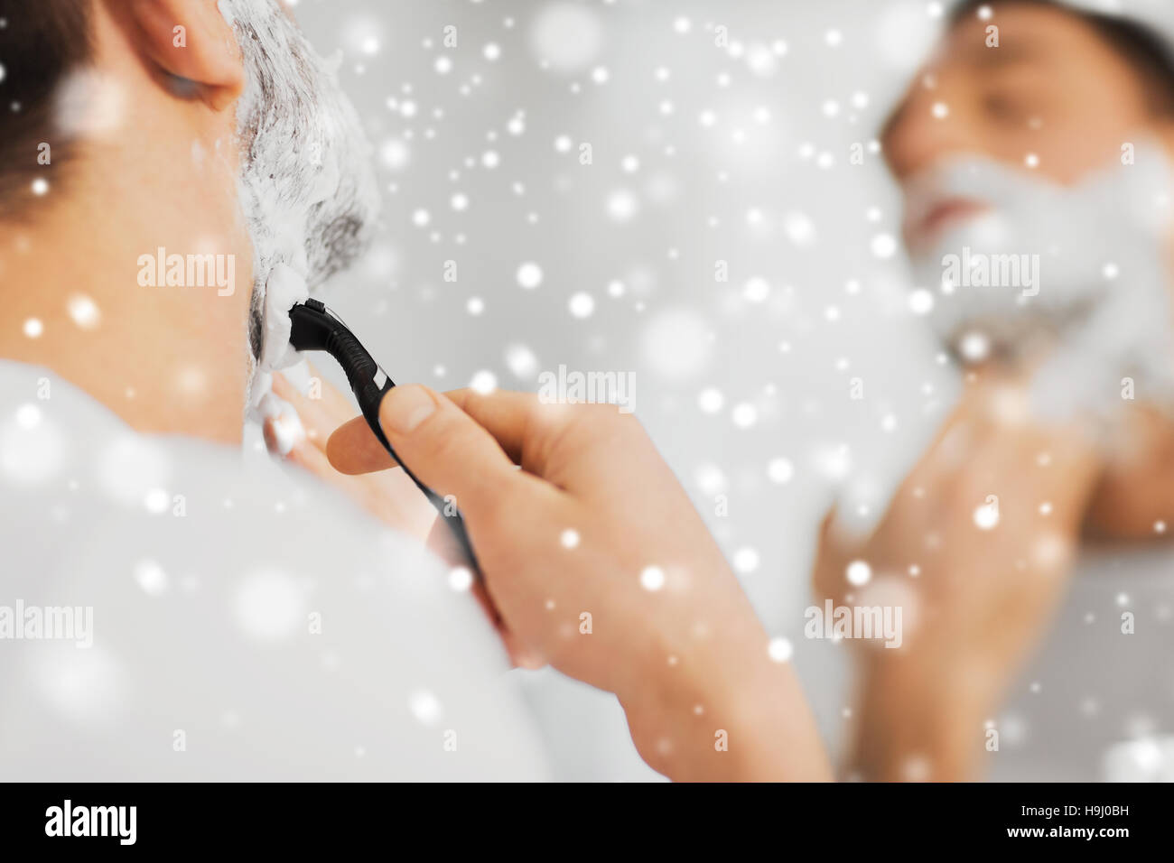 close up of man shaving beard with razor blade Stock Photo - Alamy