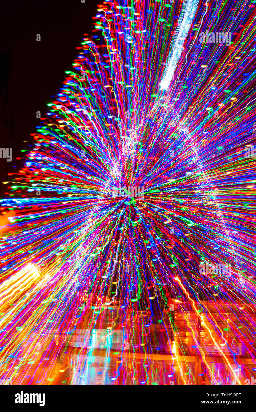Giant outdoor Christmas tree given a dramatic motion effect through ...