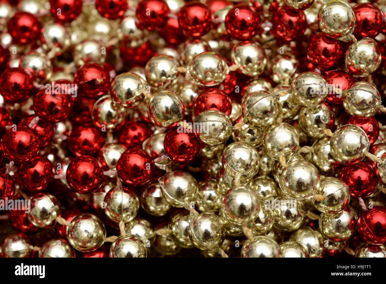 Red bead garland hi-res stock photography and images - Alamy