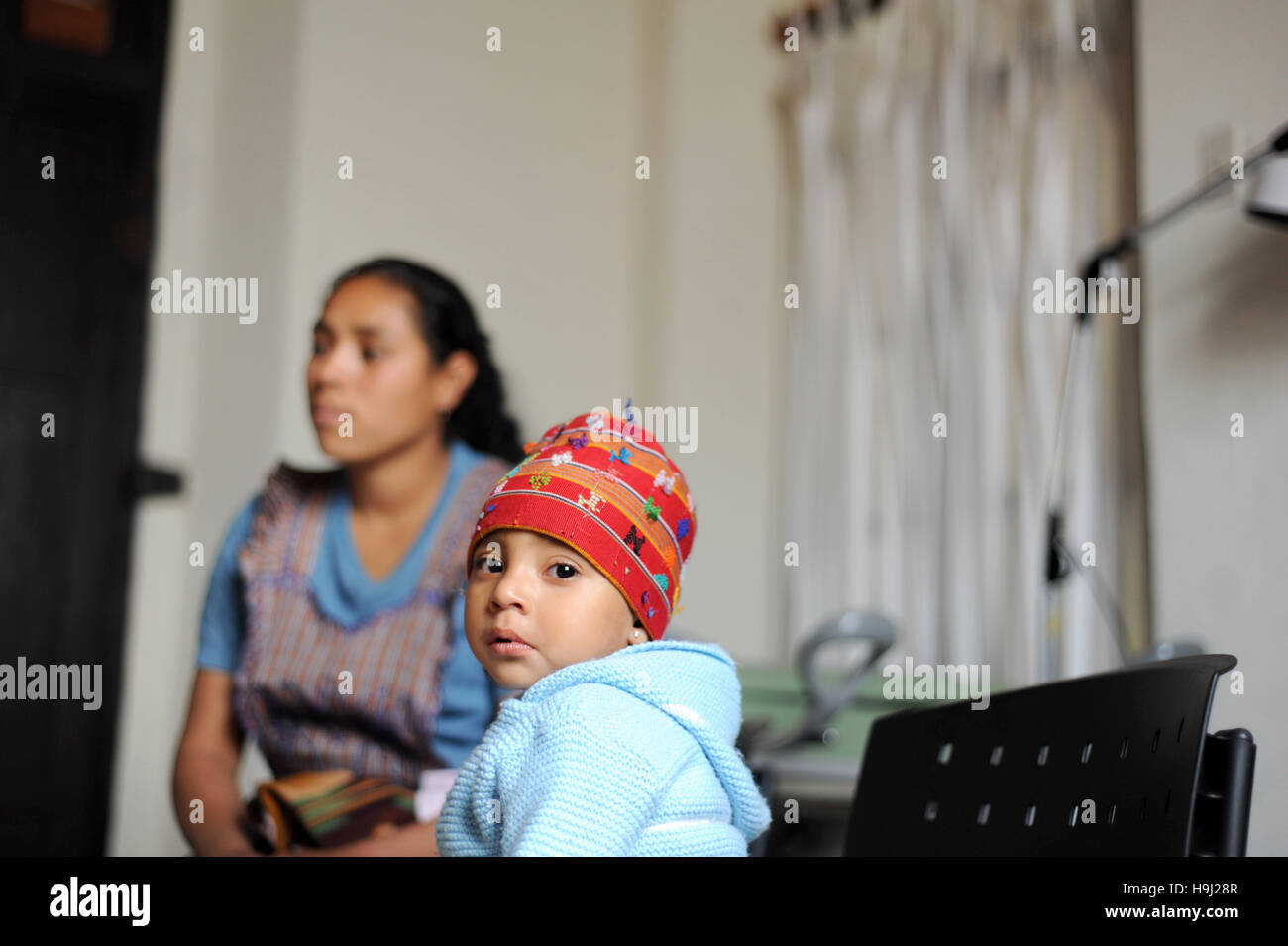 Maya indigenous mother and child at NPO office in Ciudad Vieja ...