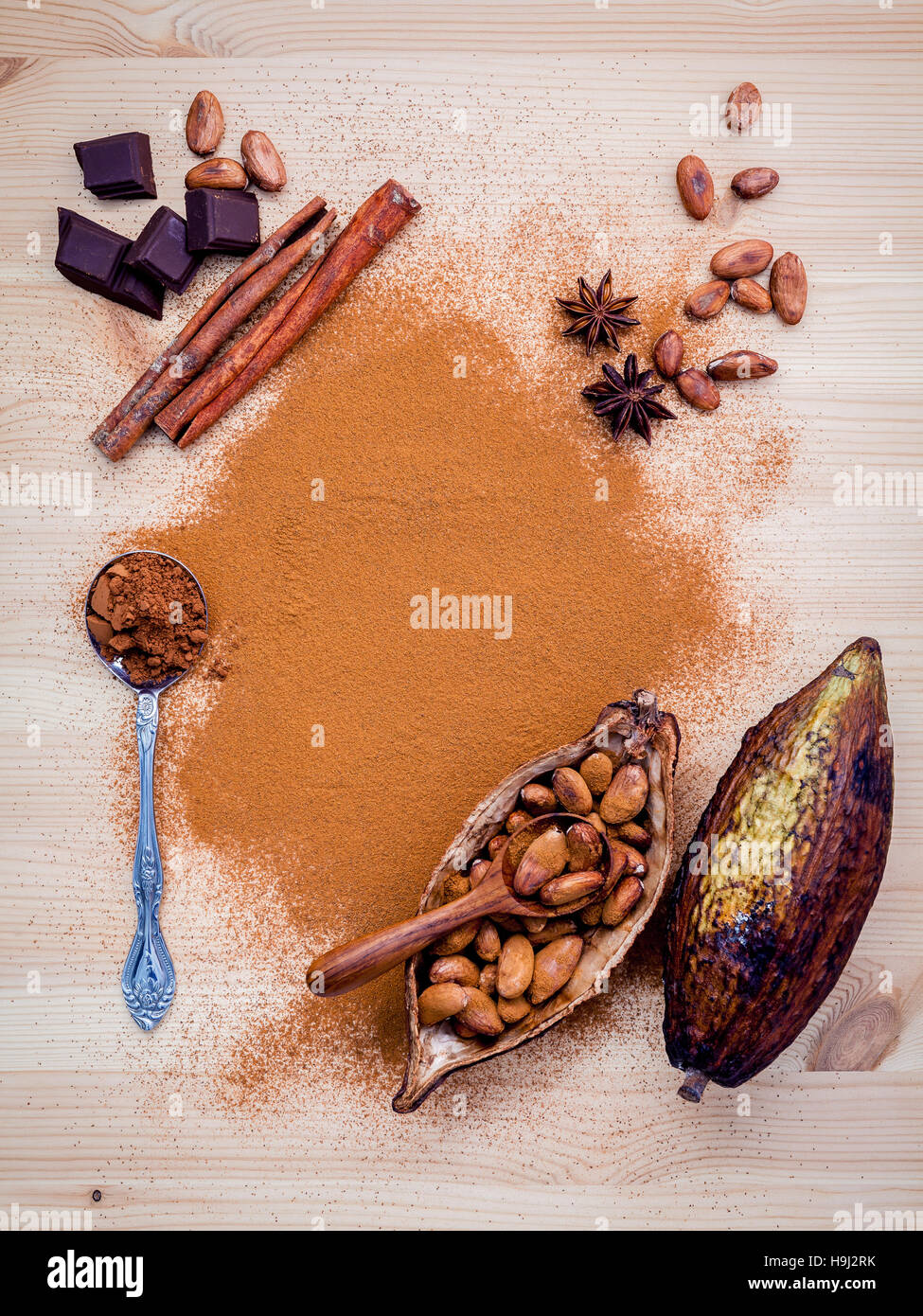 Brown chocolate powder in spoon , Roasted cocoa beans in the dry Stock ...