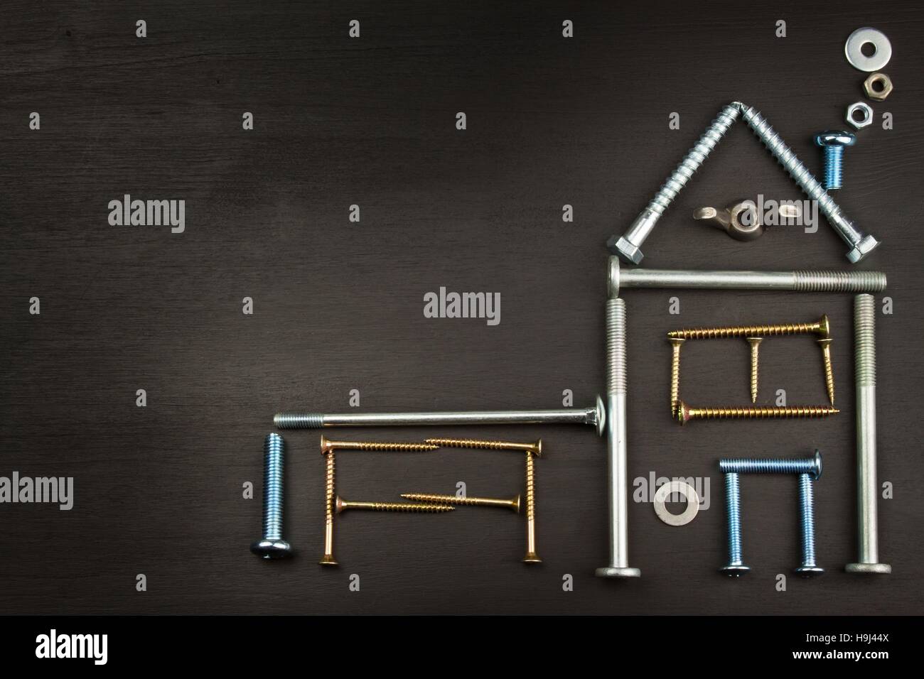 Plans to build a house. Rustic wooden background. Tools for builders ...