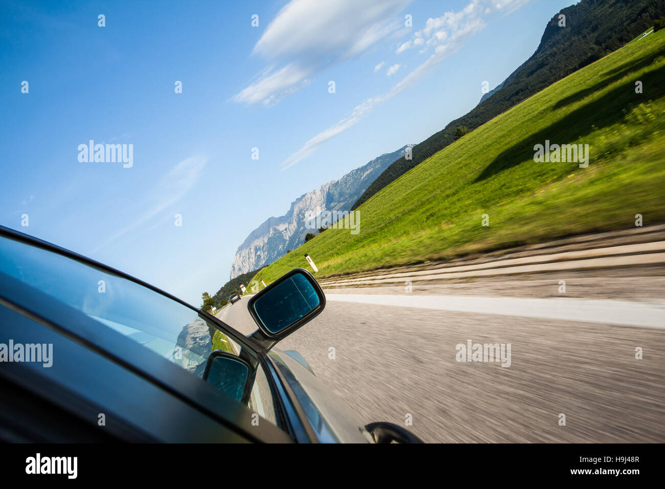 car speed in action driving on highway Stock Photo - Alamy