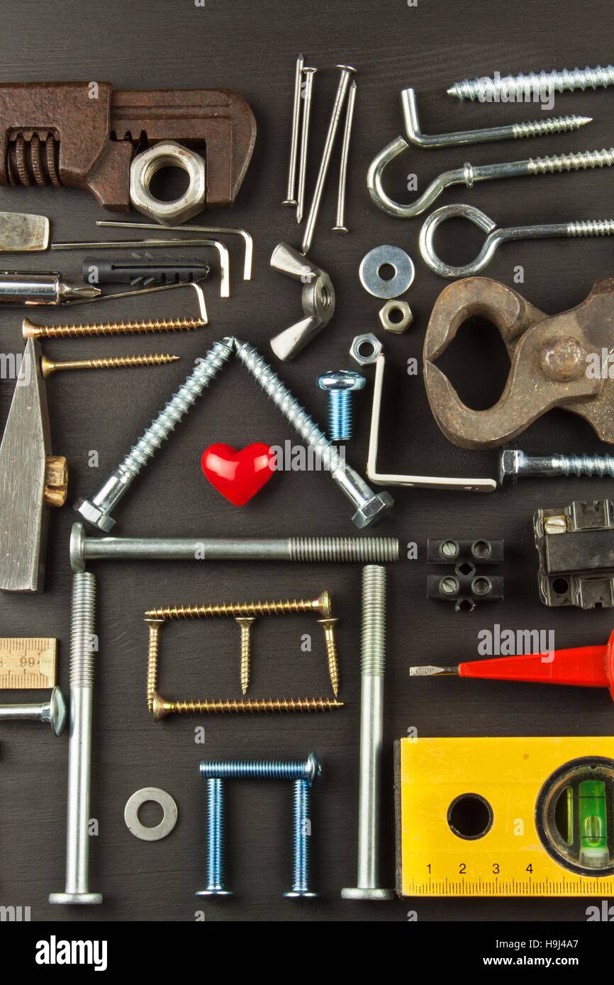 Plans to build a house. Rustic wooden background. Tools for builders ...