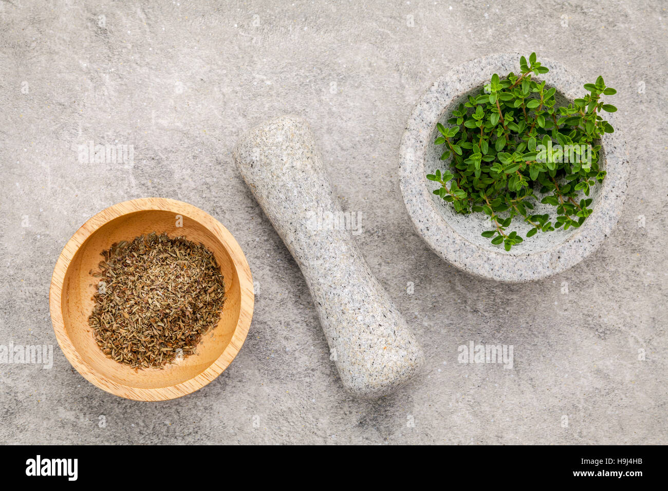 Closeup lemon thyme leaves from the herb garden in white mortar Stock ...