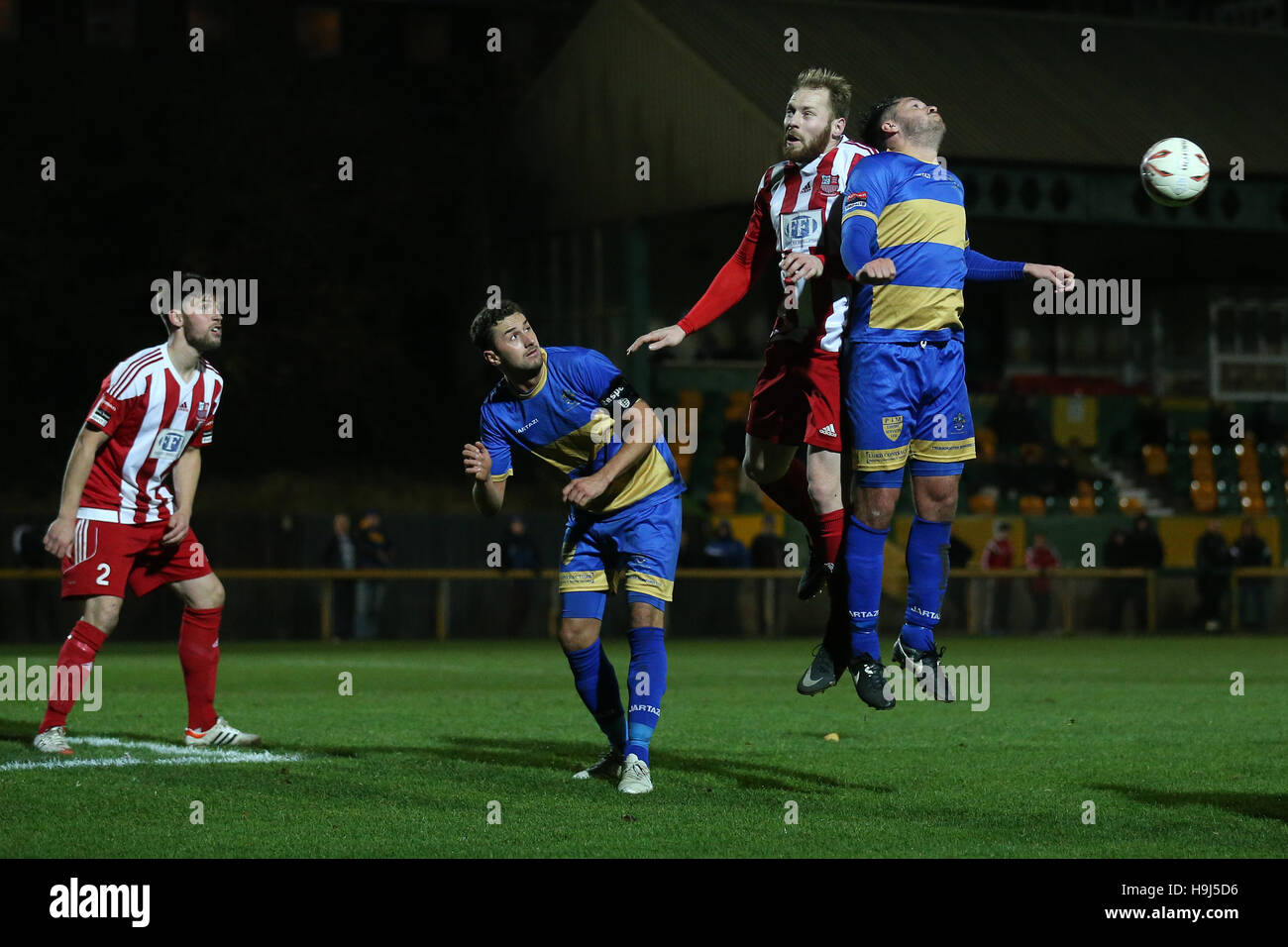 Chris Taylor of Romford rises with Callum Leahy of Bowers during ...