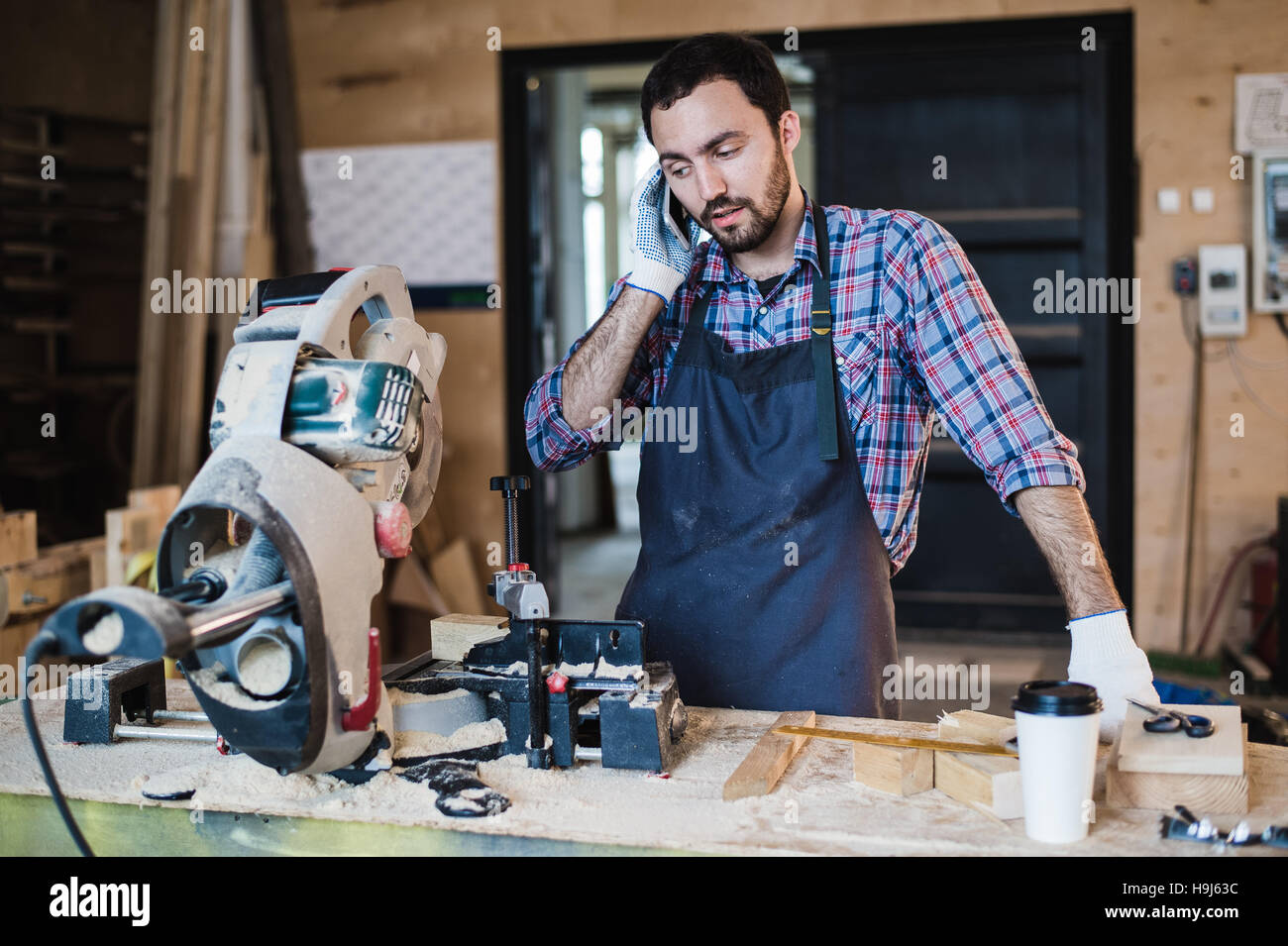 Construction foreman calling phone hi-res stock photography and images ...