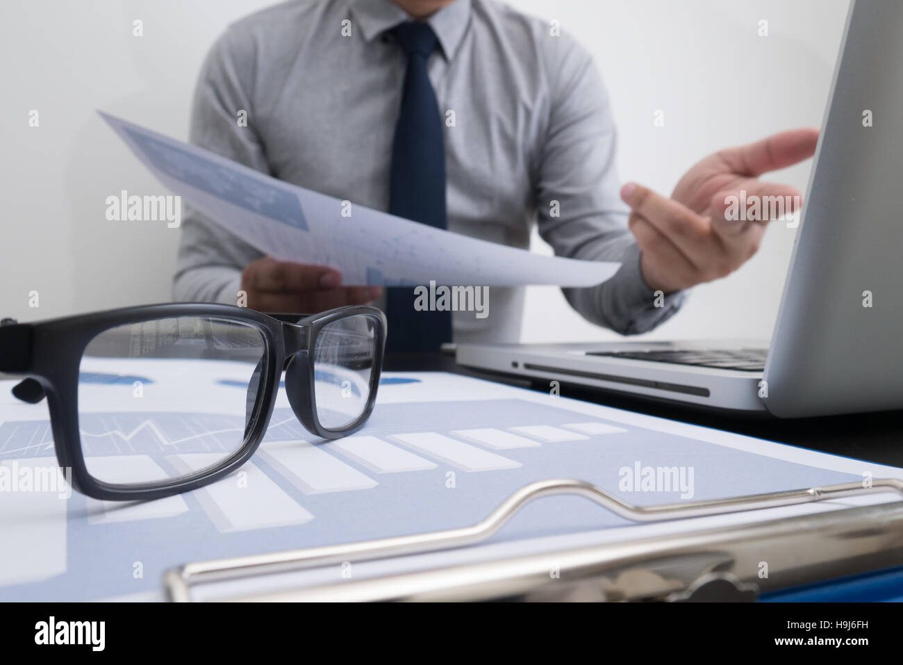 business documents on office table with smart phone and digital Stock ...