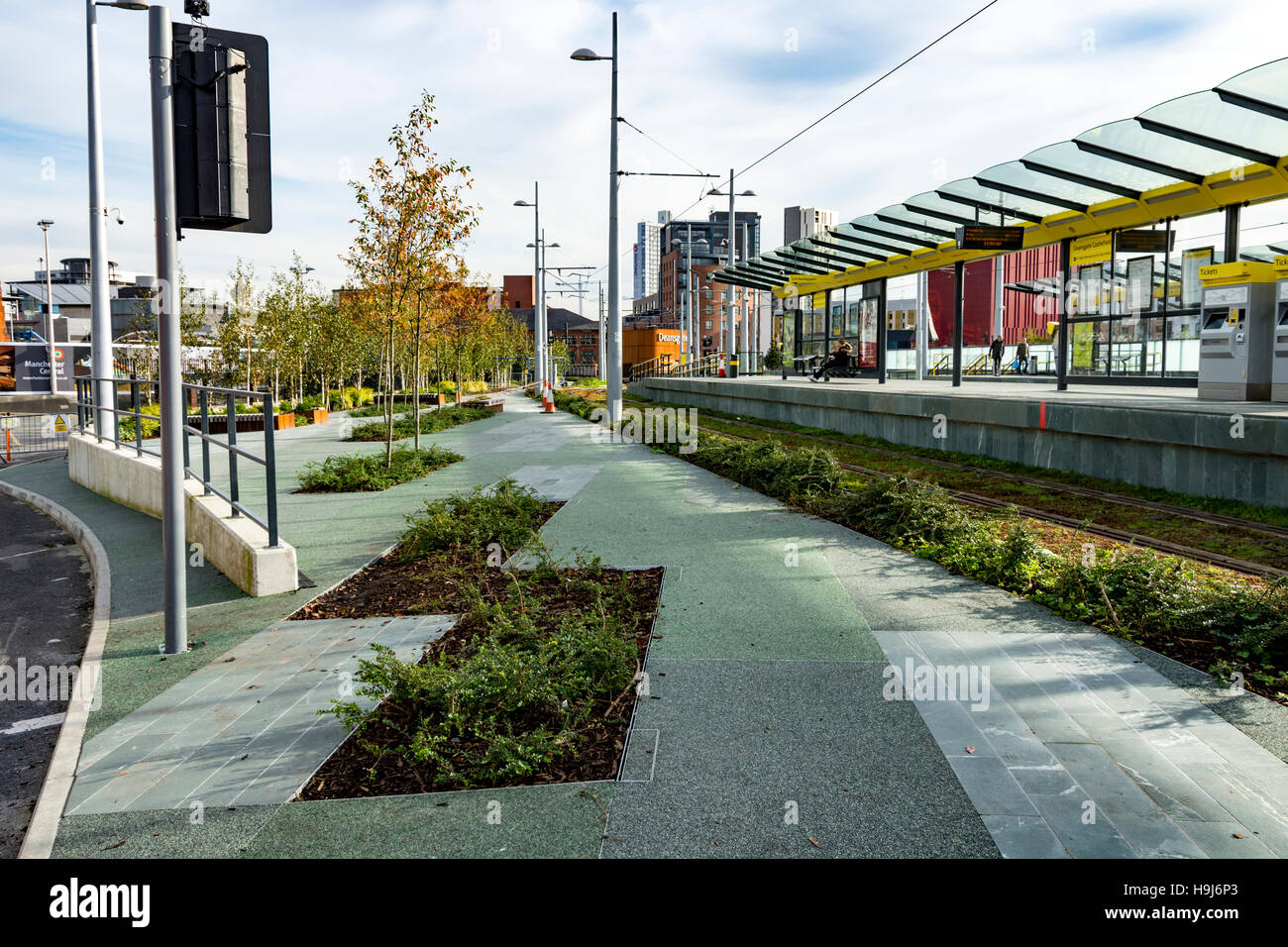 Flower beds and landscaping at the Deansgate-Castlefield tram stop ...