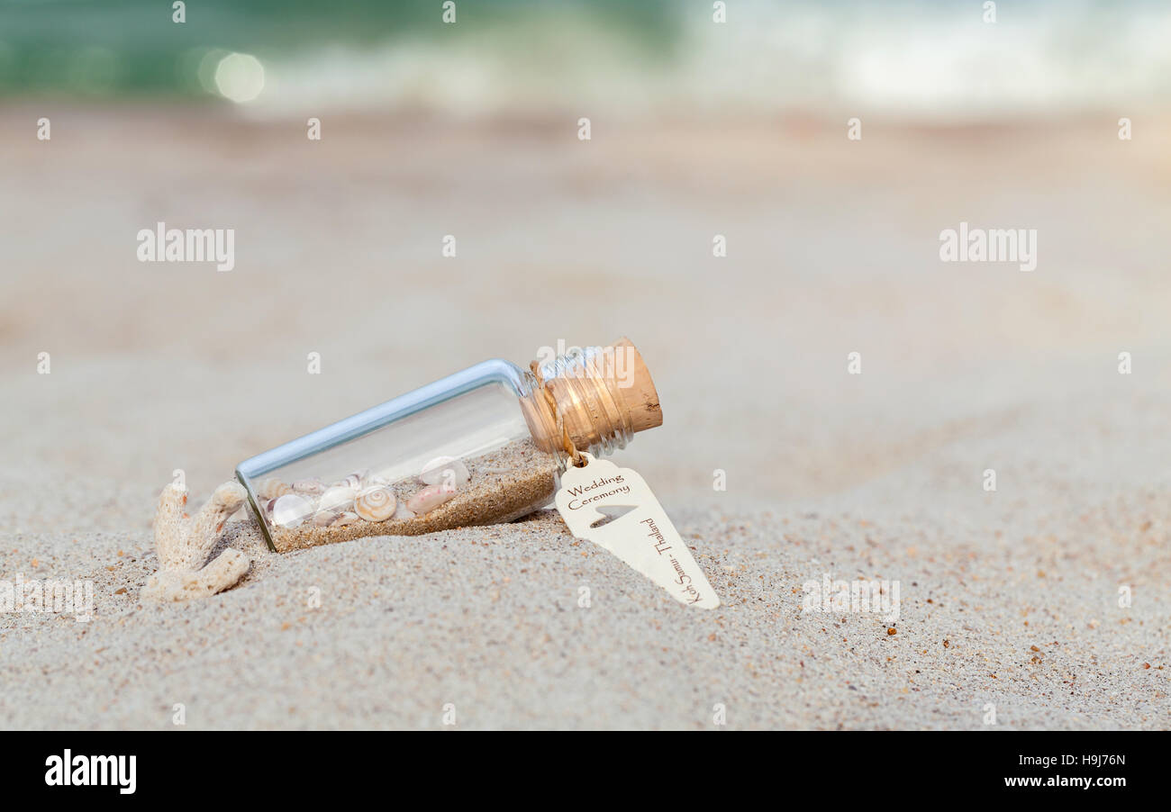 Sand and sea shell in bottle put on the beach concept for weddi Stock ...