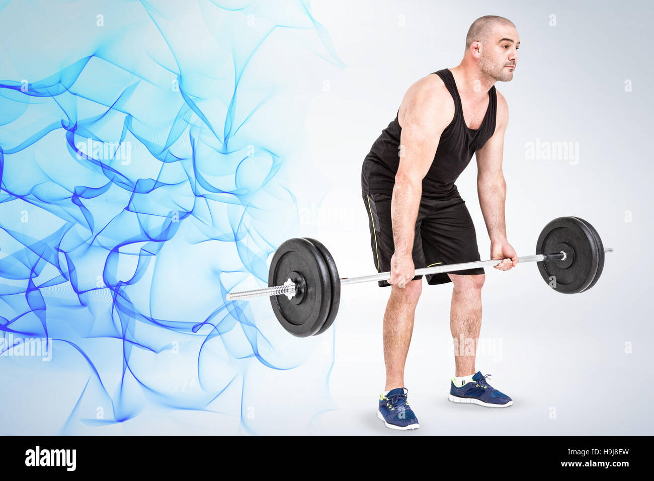Composite image of bodybuilder lifting heavy barbell weights Stock ...