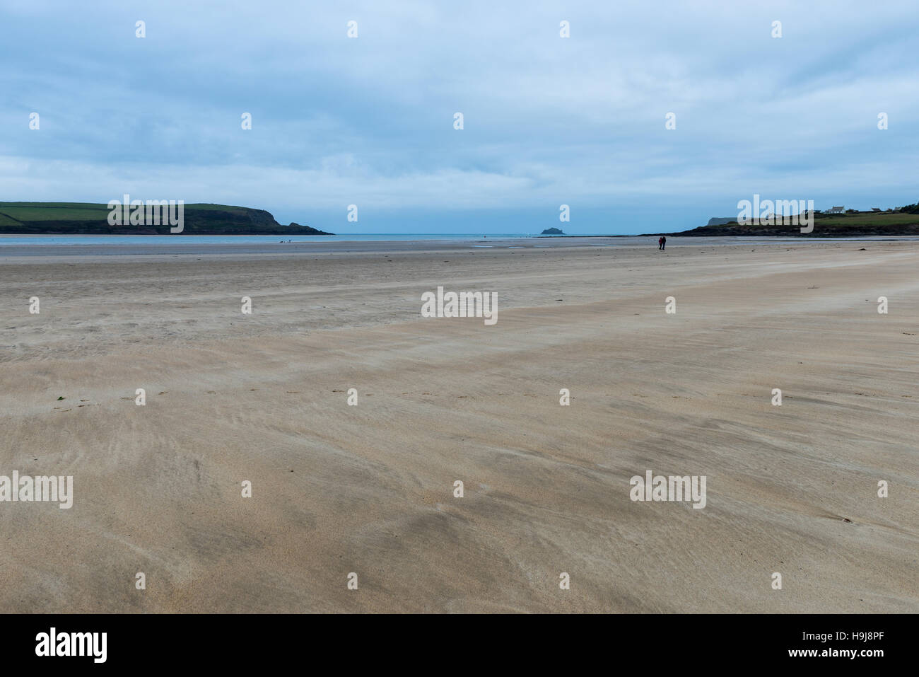 A wide expanse of beach in Daymer Bay, North Cornwall. The beach is ...