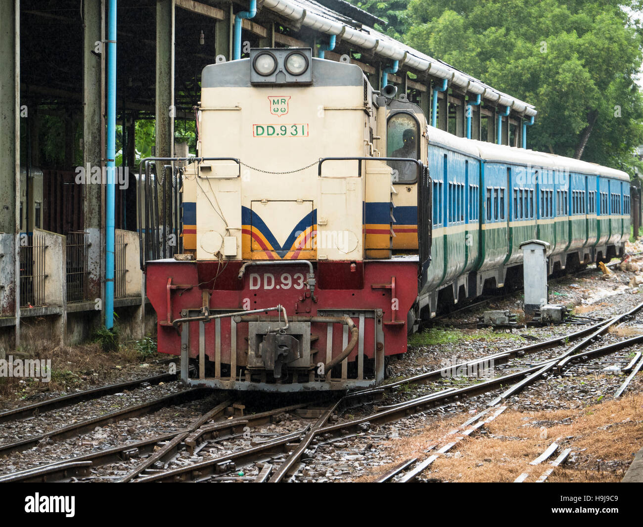 Passenger train arriving at Yangon Central Railway Station in Yangon ...