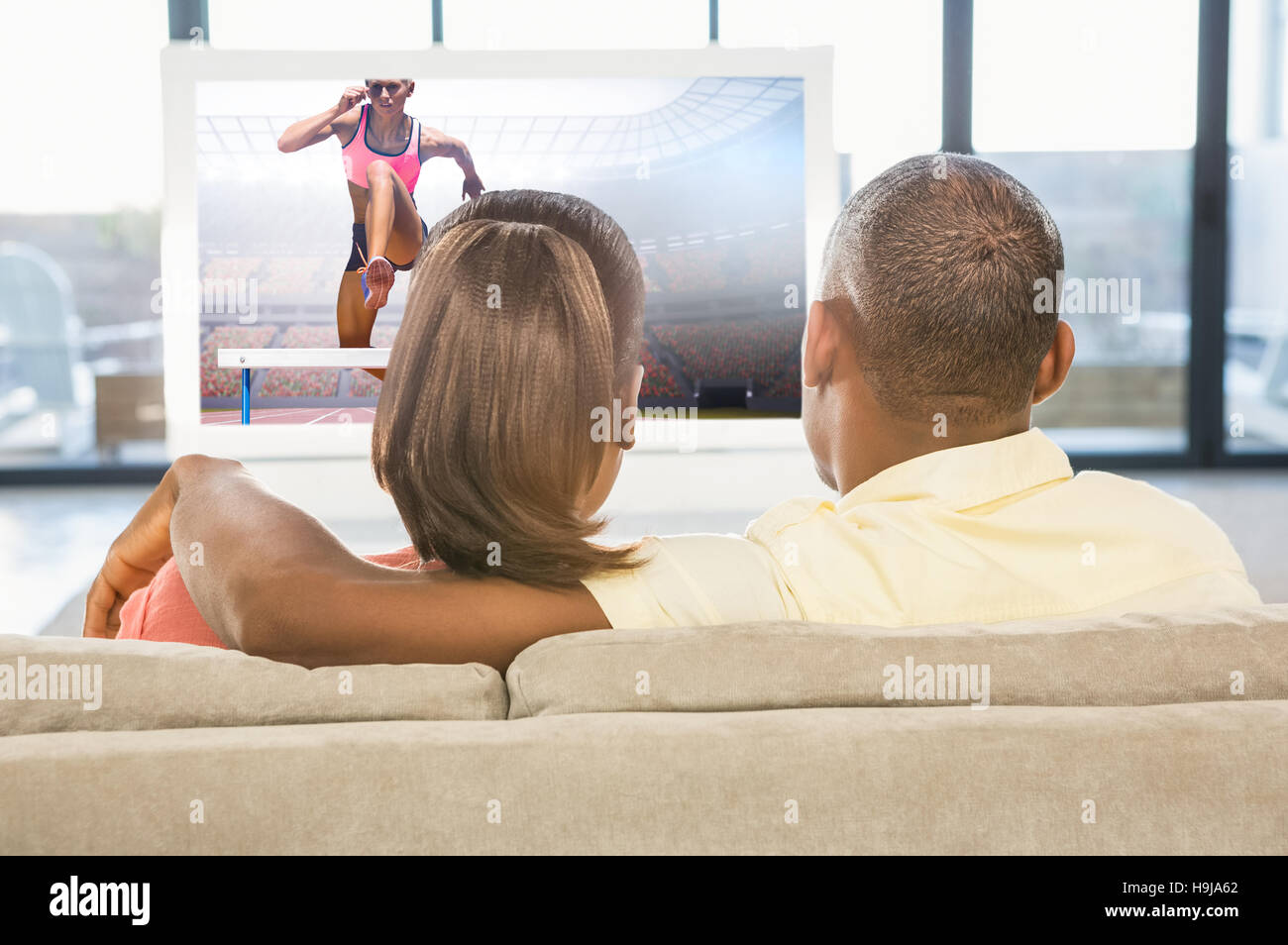 Composite image of athletic woman practicing show jumping Stock Photo ...