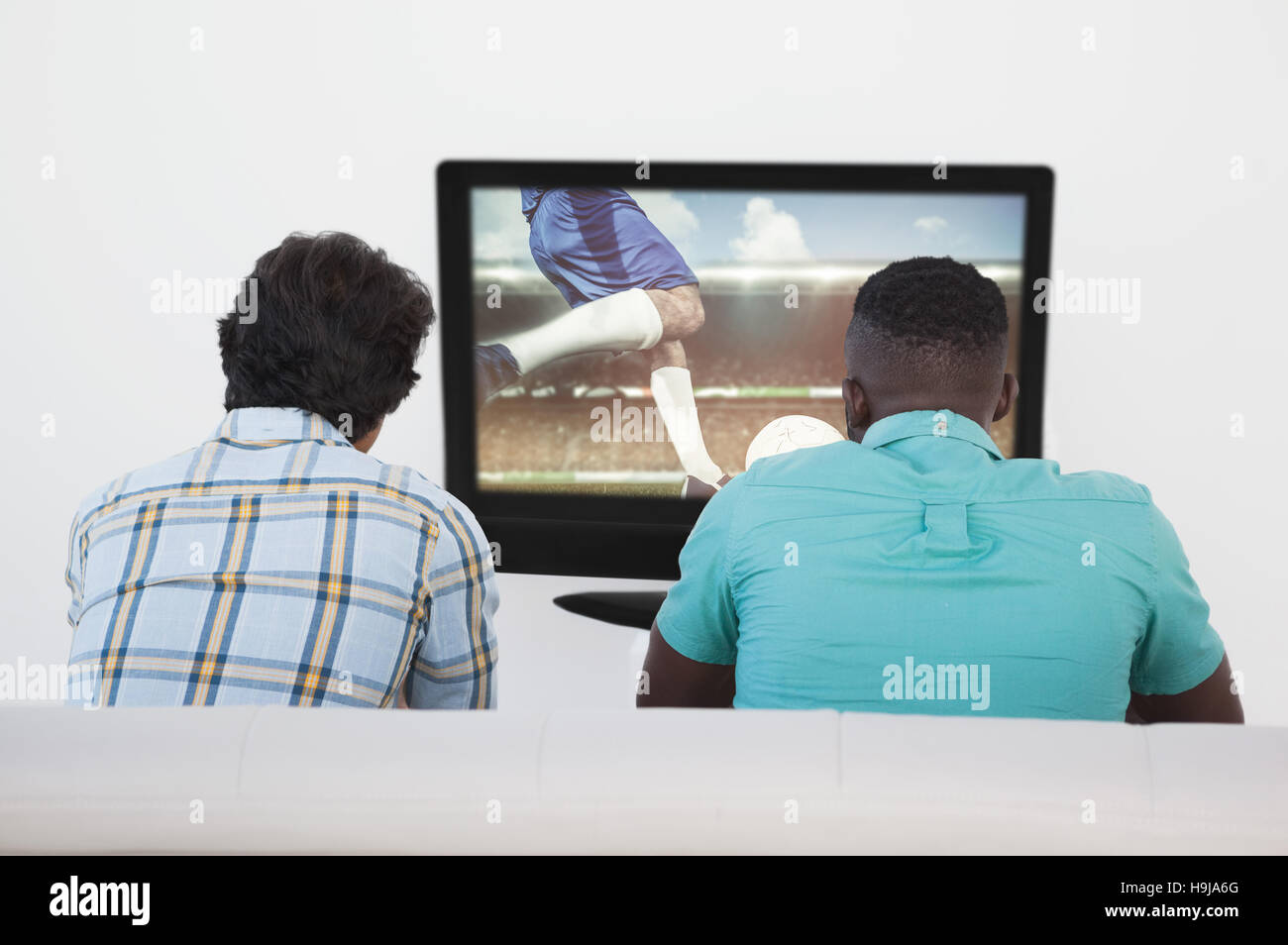 Kicking into television hi-res stock photography and images - Alamy