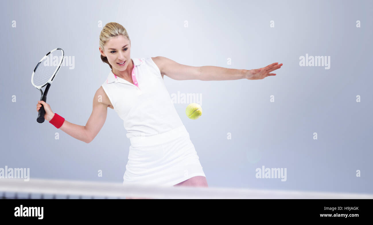 Composite image of athlete playing tennis with a racket Stock Photo - Alamy
