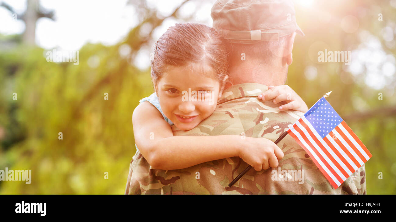 Portrait of girl hugging army officer father Stock Photo - Alamy