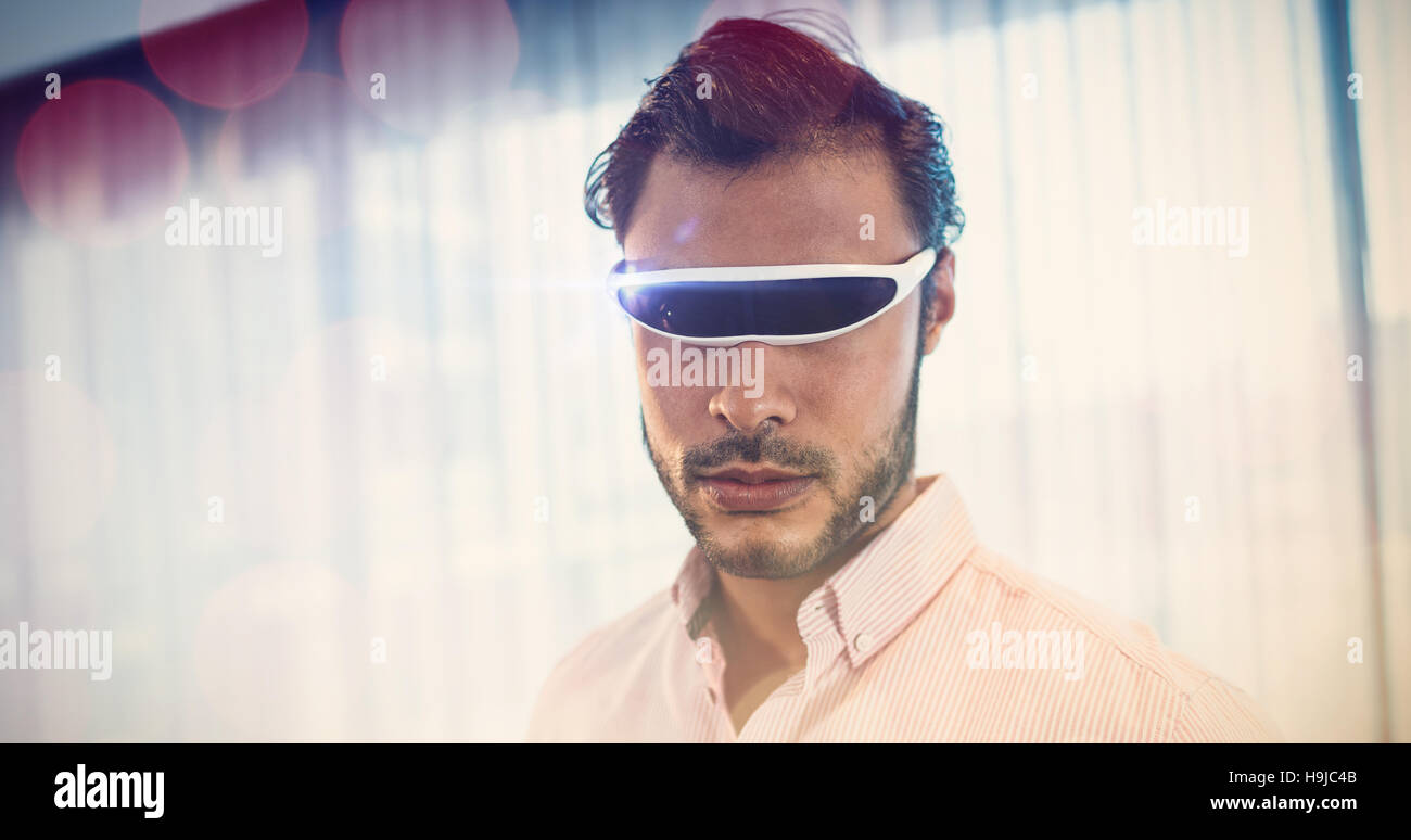 Businessman using an oculus Stock Photo - Alamy
