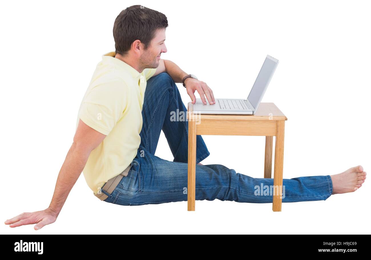 Laptop man table Cut Out Stock Images & Pictures - Alamy